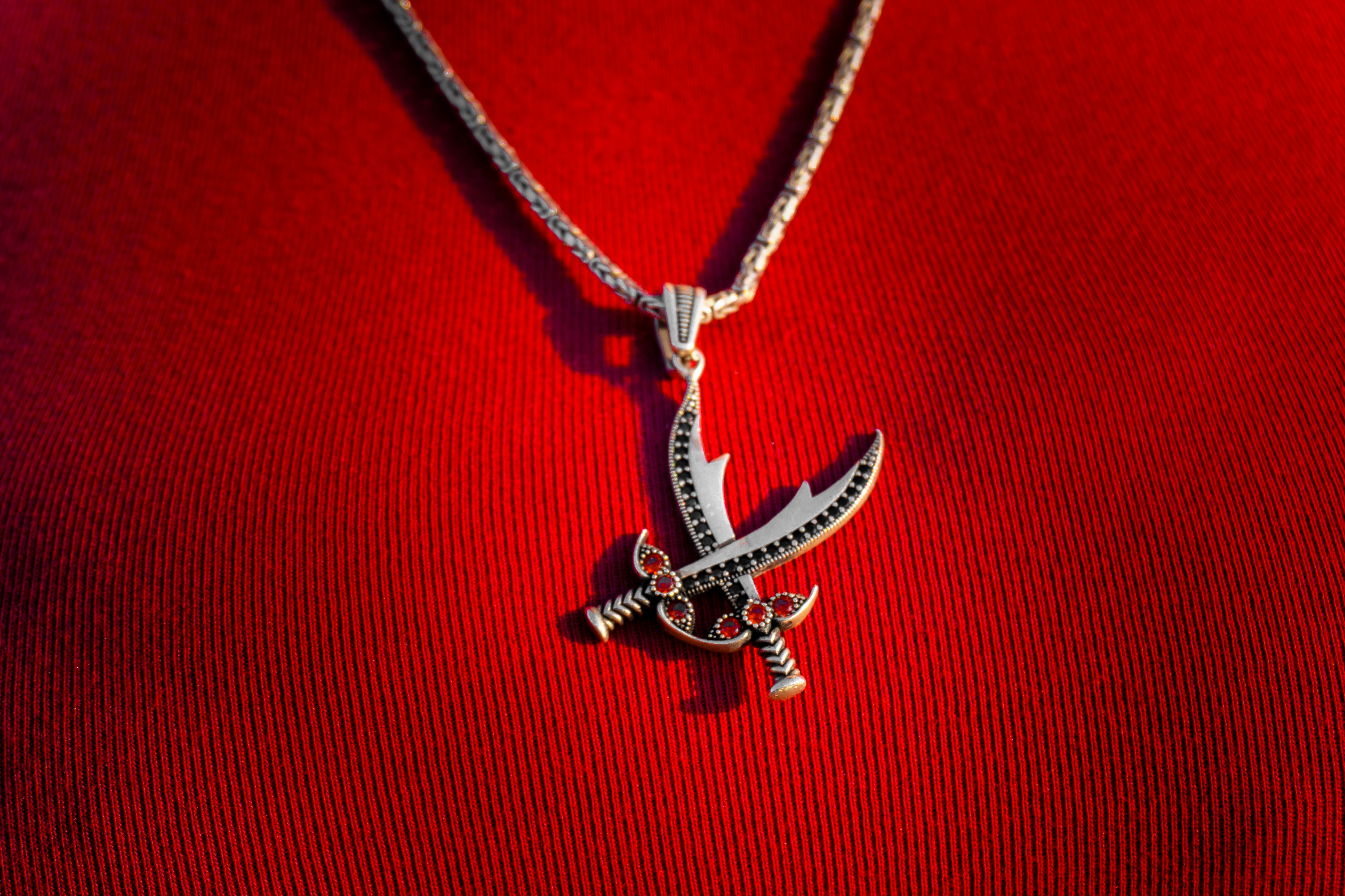 Crimson Fabric and Crescent Blade Pendant