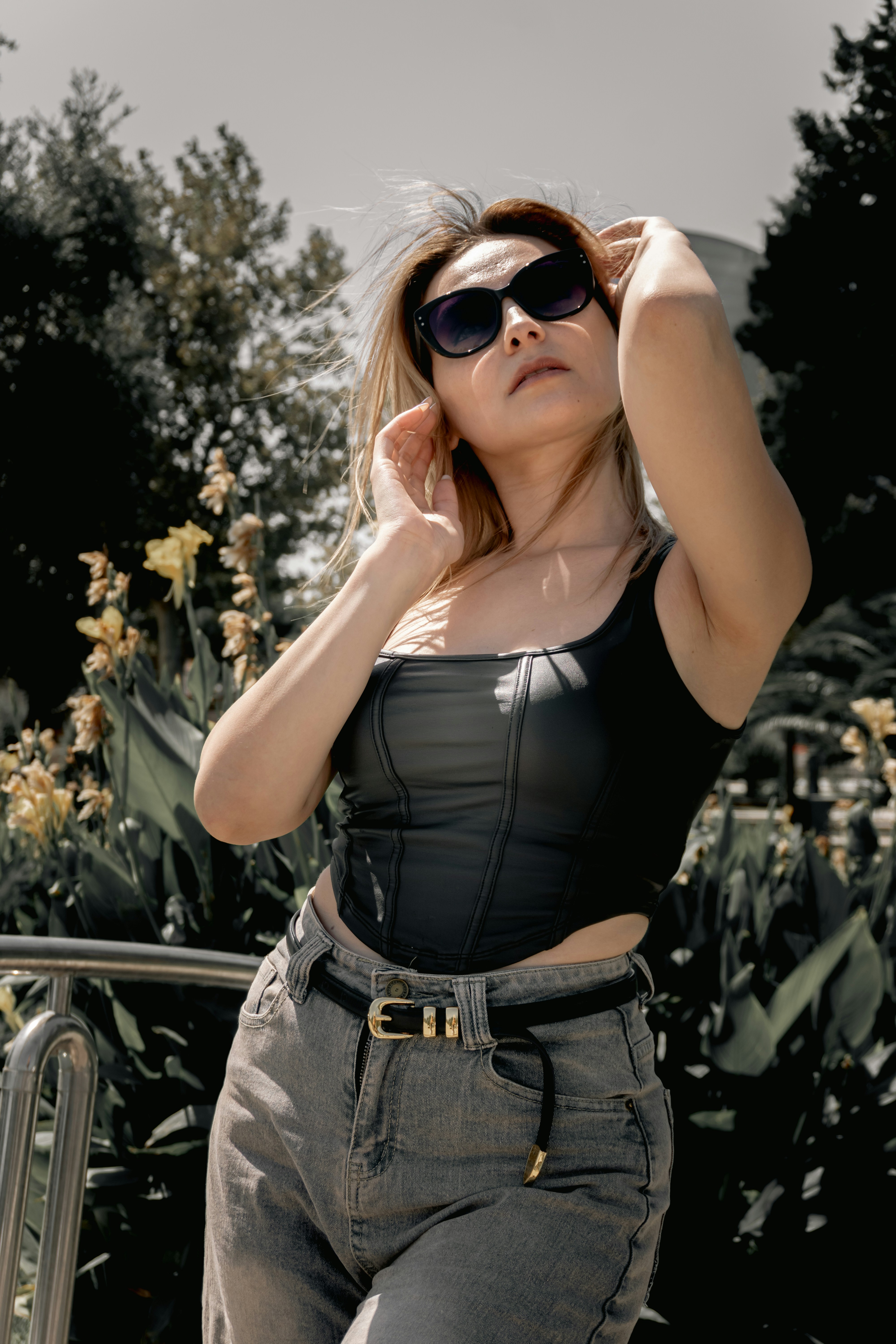 Bold Confidence: A Sunlit Portrait in Leather and Light