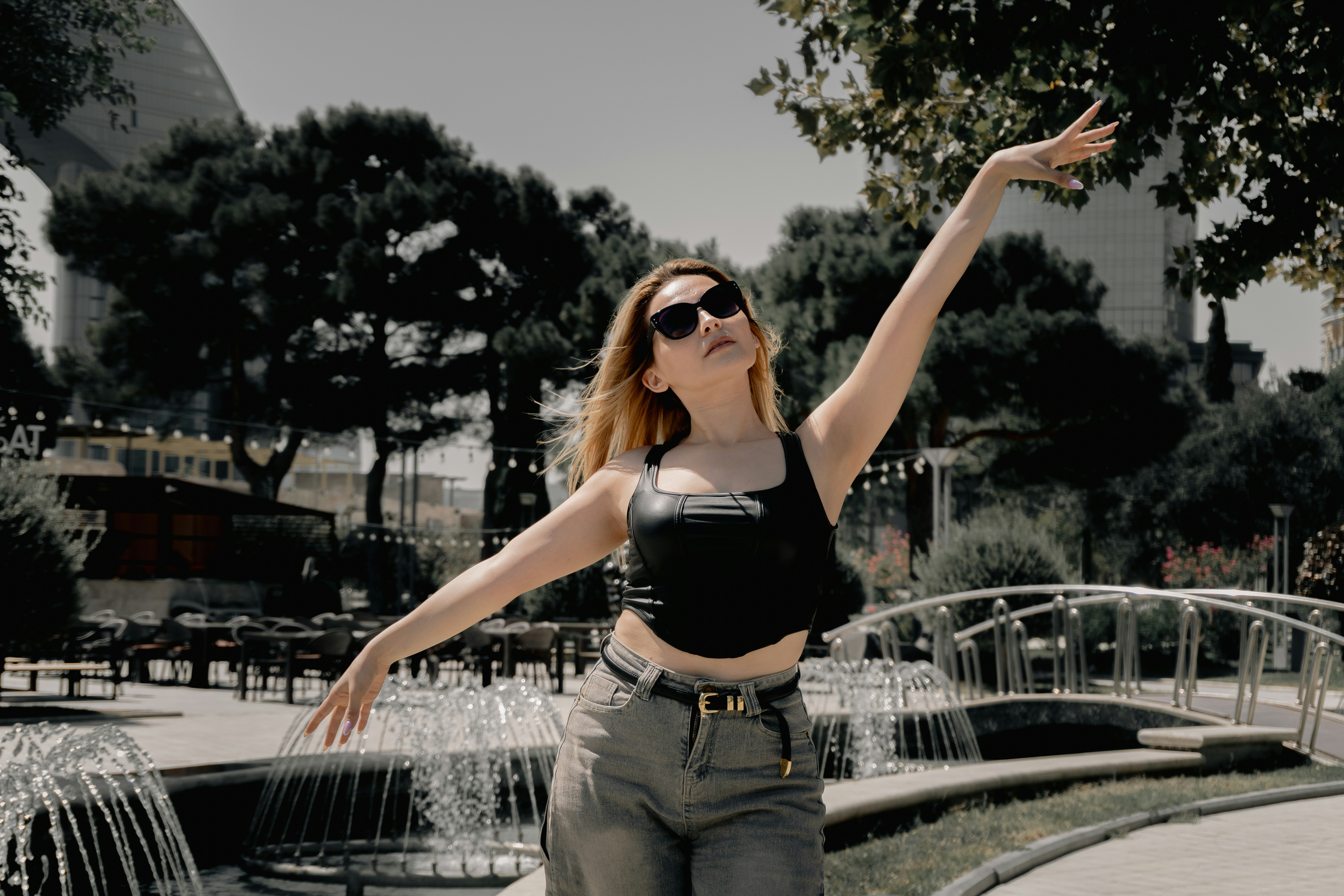 Sunlit Pose by the Courtyard Fountain