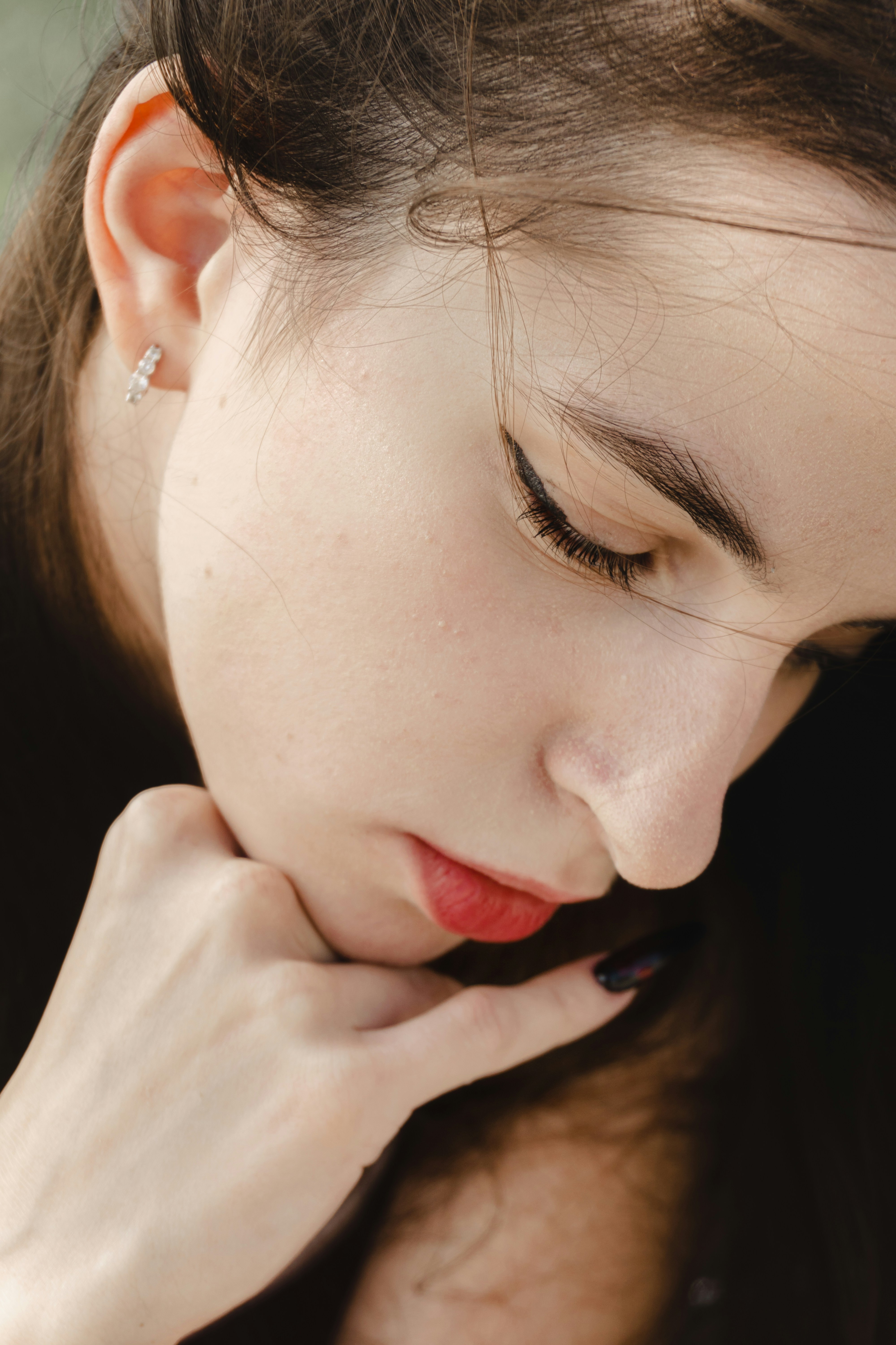 Soft Contemplation: A Close-Up Portrait in Gentle Light