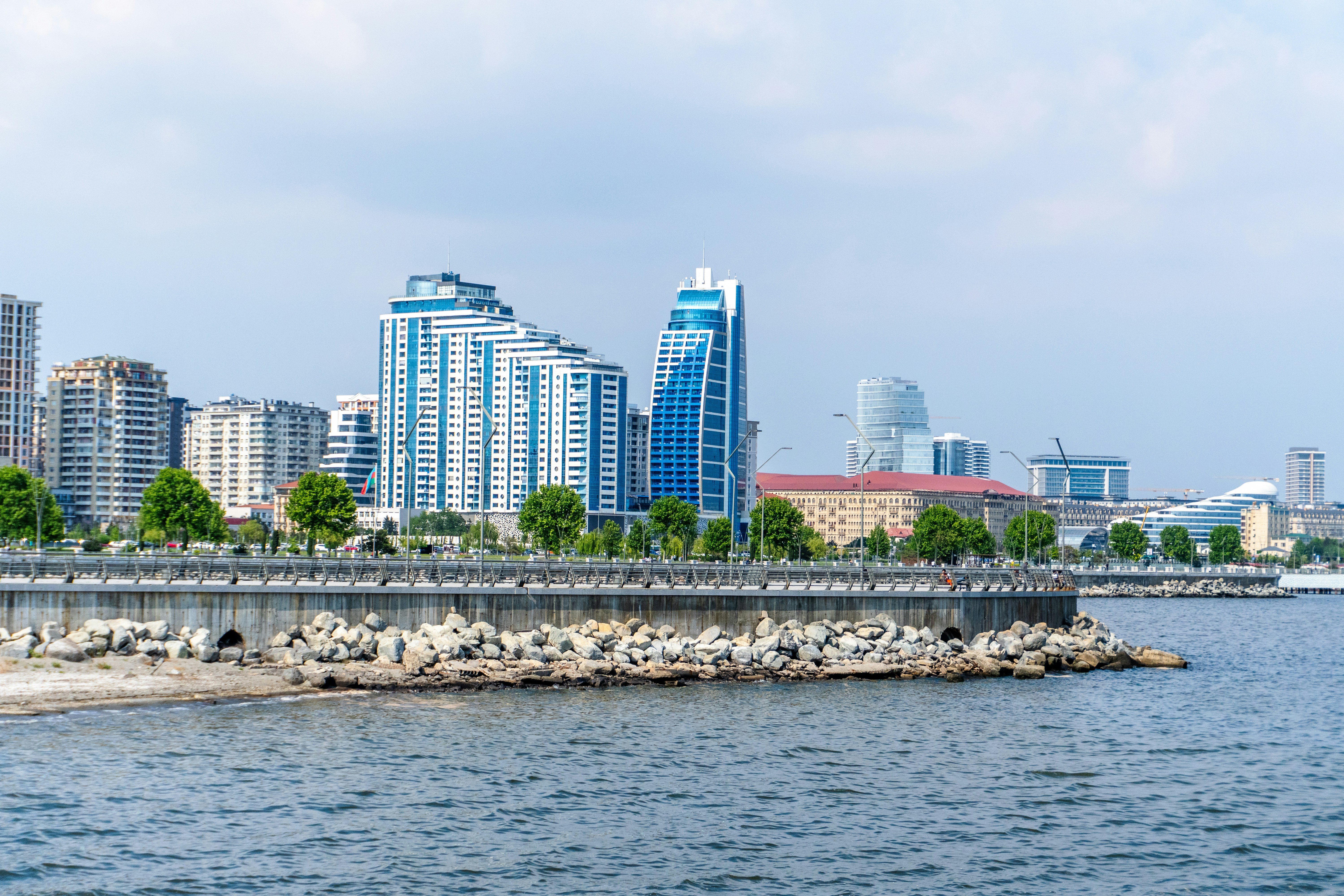 Harbor Skyline with Modern Towers Rising Over a Calm Sea