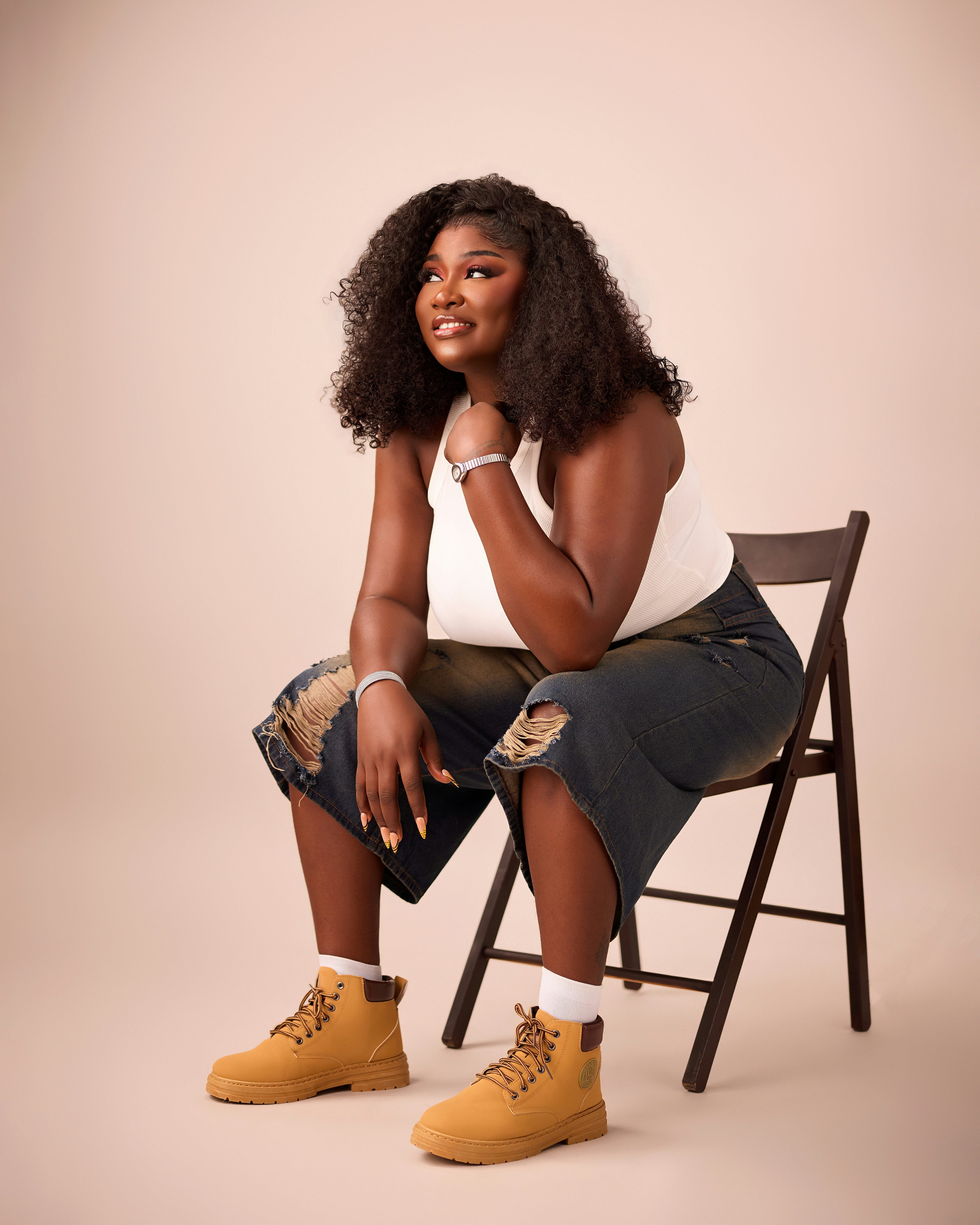 Natural Confidence: A Studio Portrait in Warm Tone