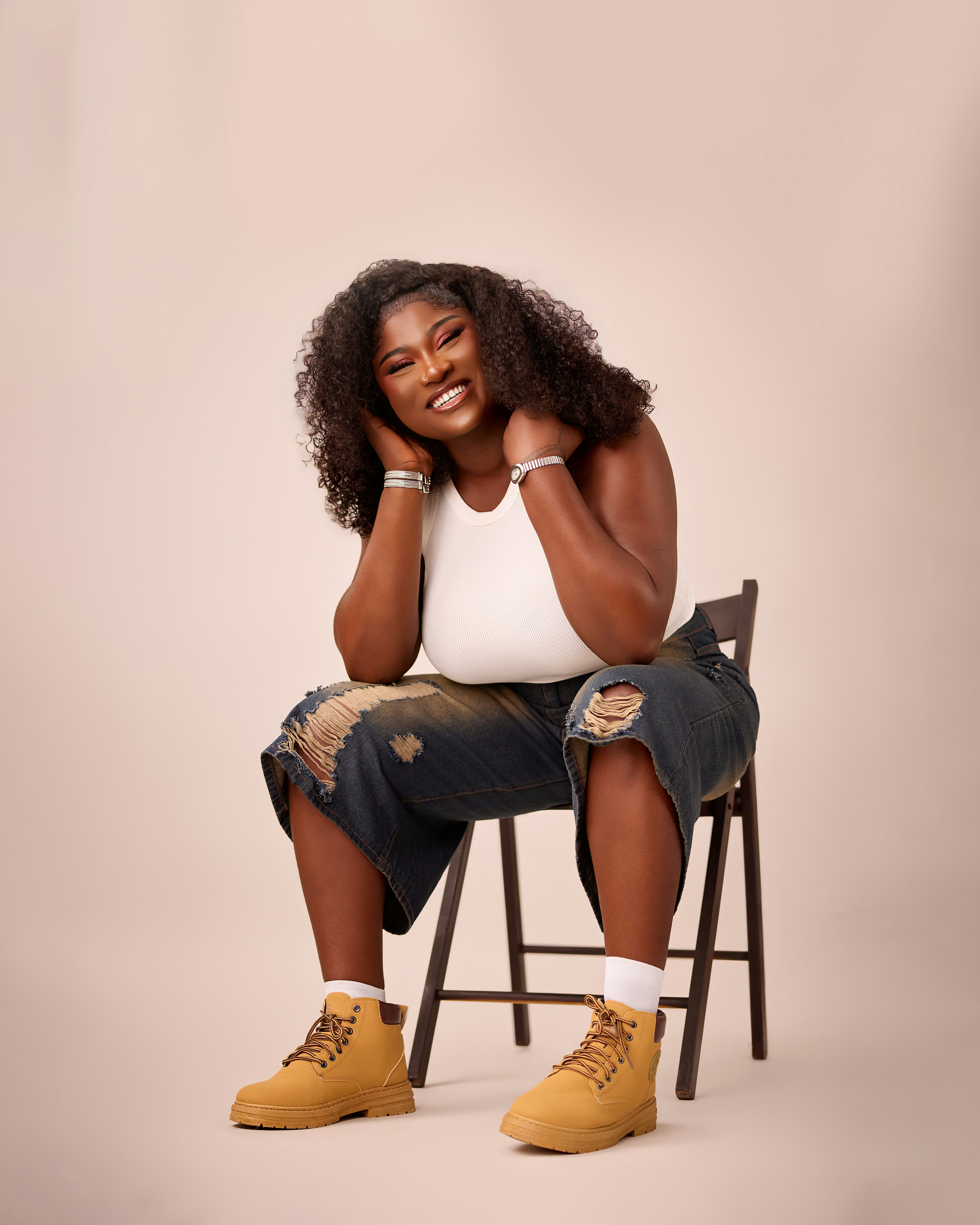 Smiling Confidence: Portrait of Style and Ease