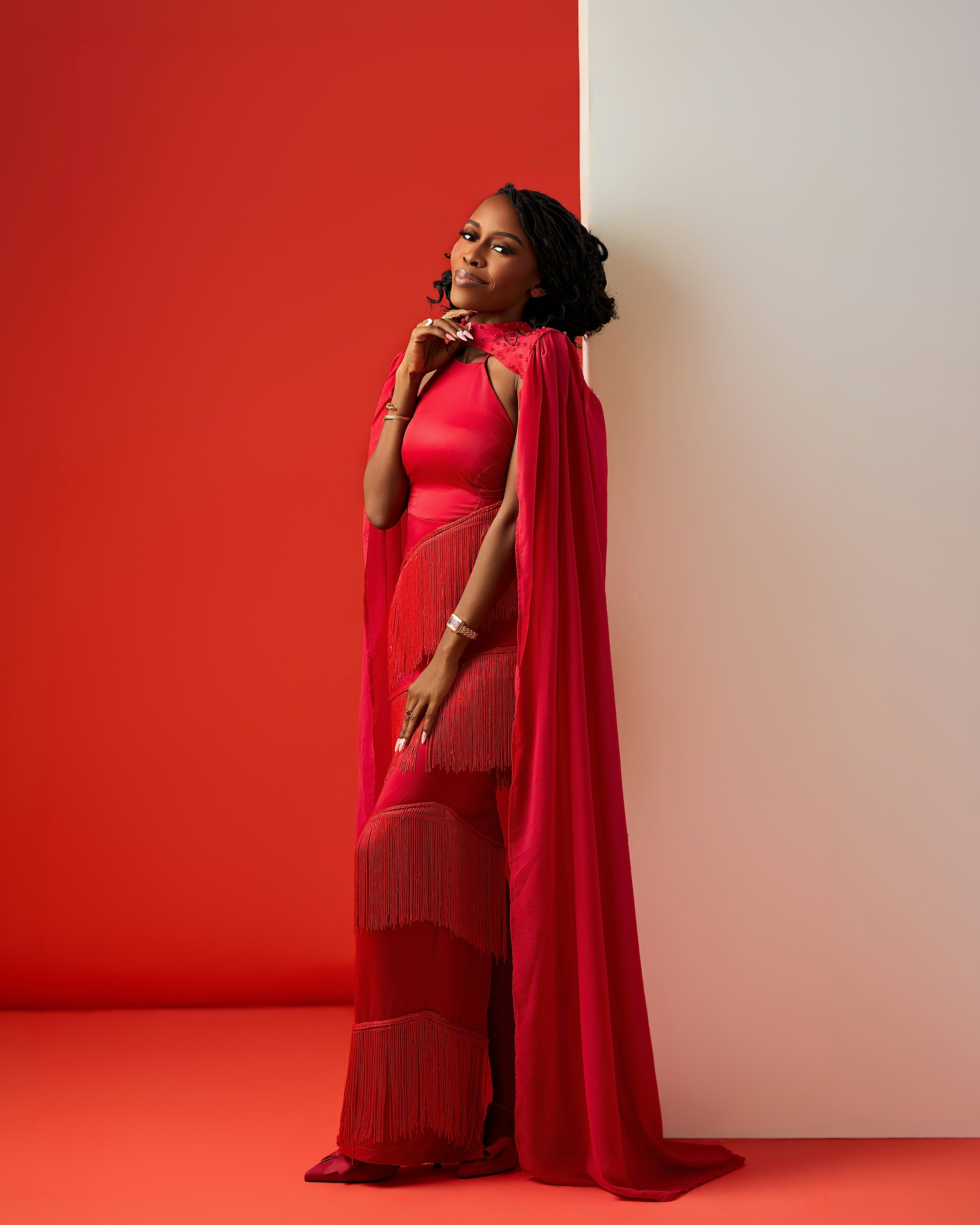 Red Velvet Aura: A poised silhouette in a crimson homage
