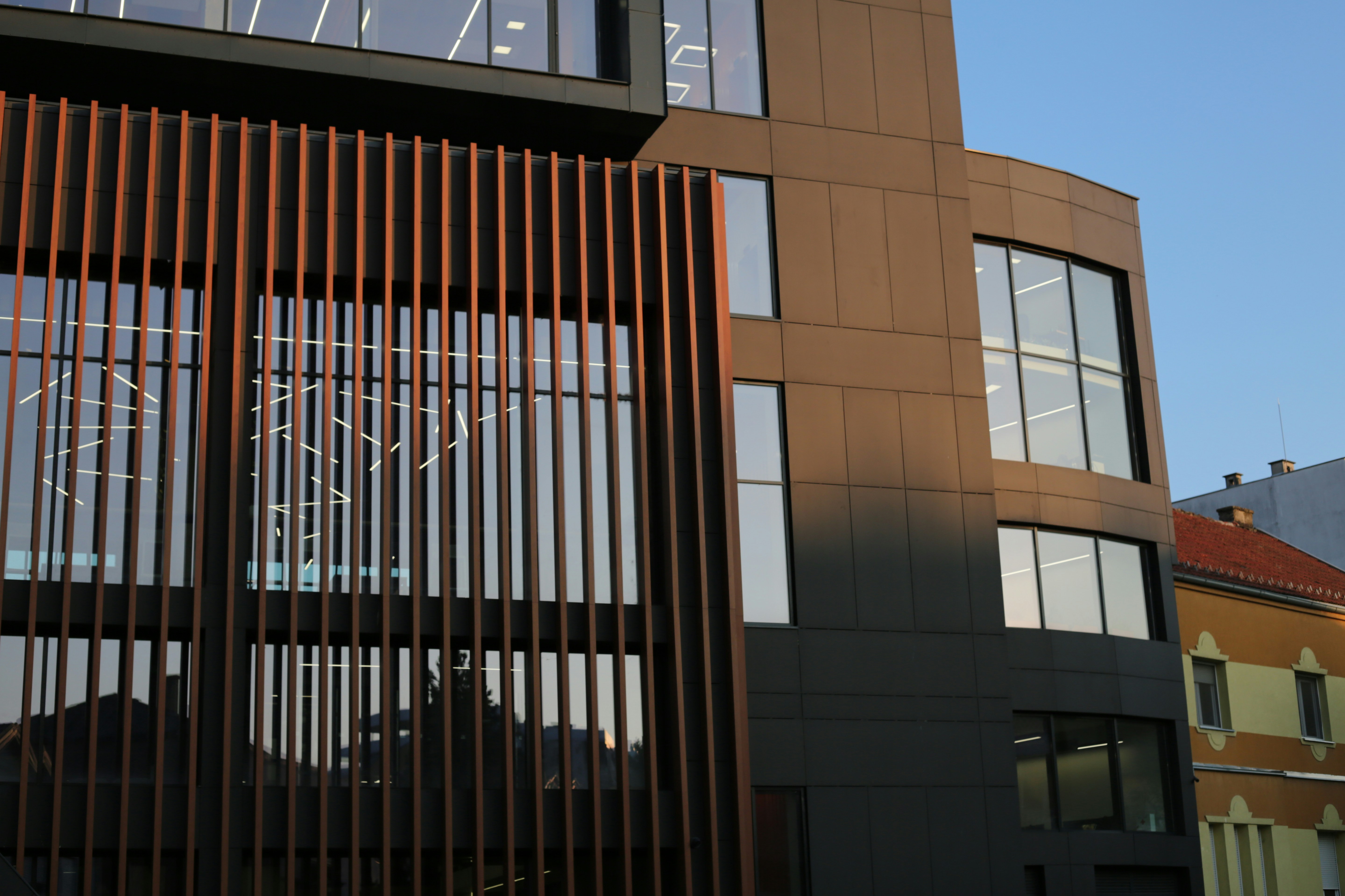 Vertical Slats and Modern Facade: A City Building in Quiet Light