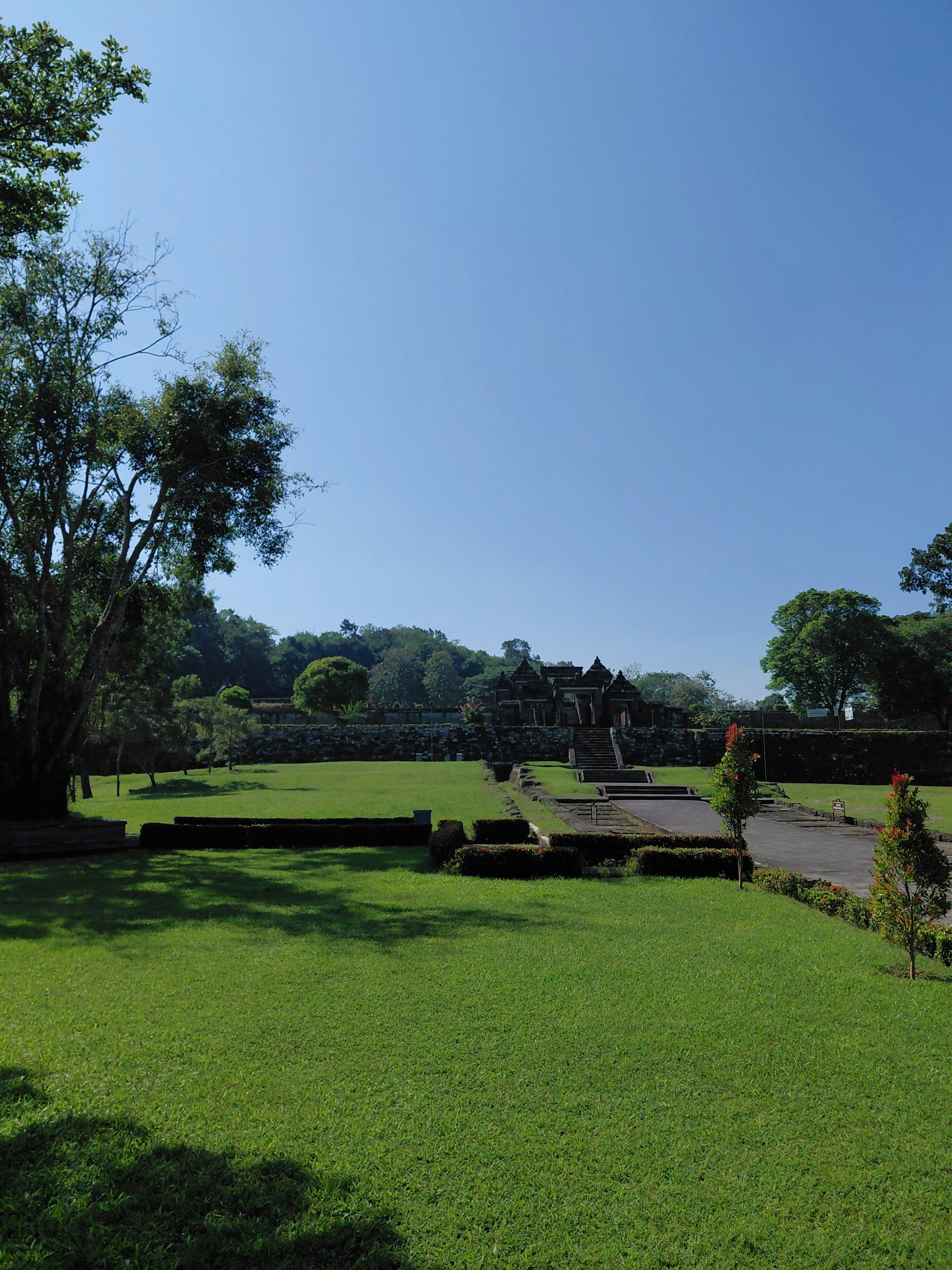 Sunlit Grotto and Lawn at an Ancient Fortress Garden
