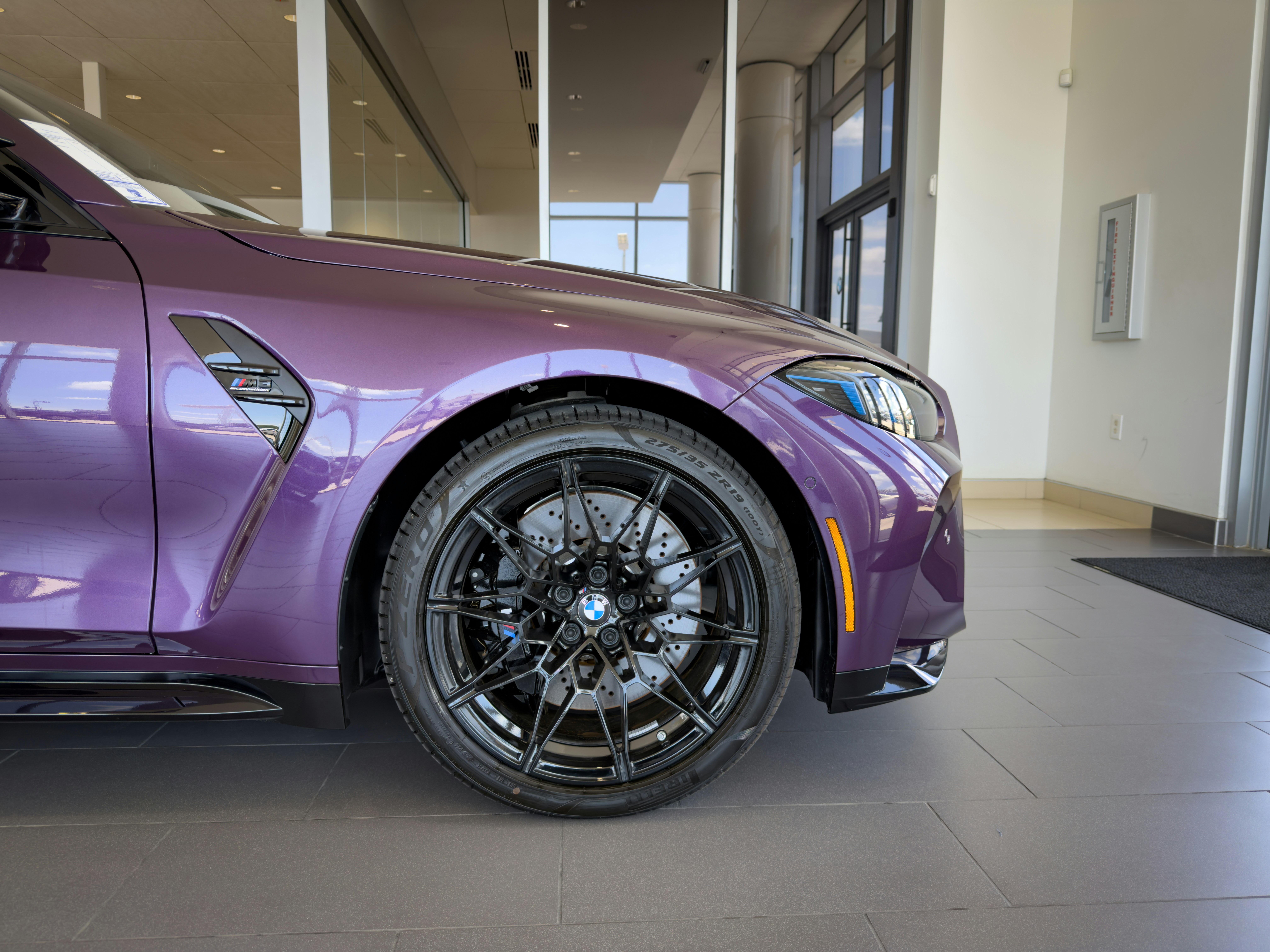 Lavender Velocity: Close-Up on a Purple BMW M Wheel