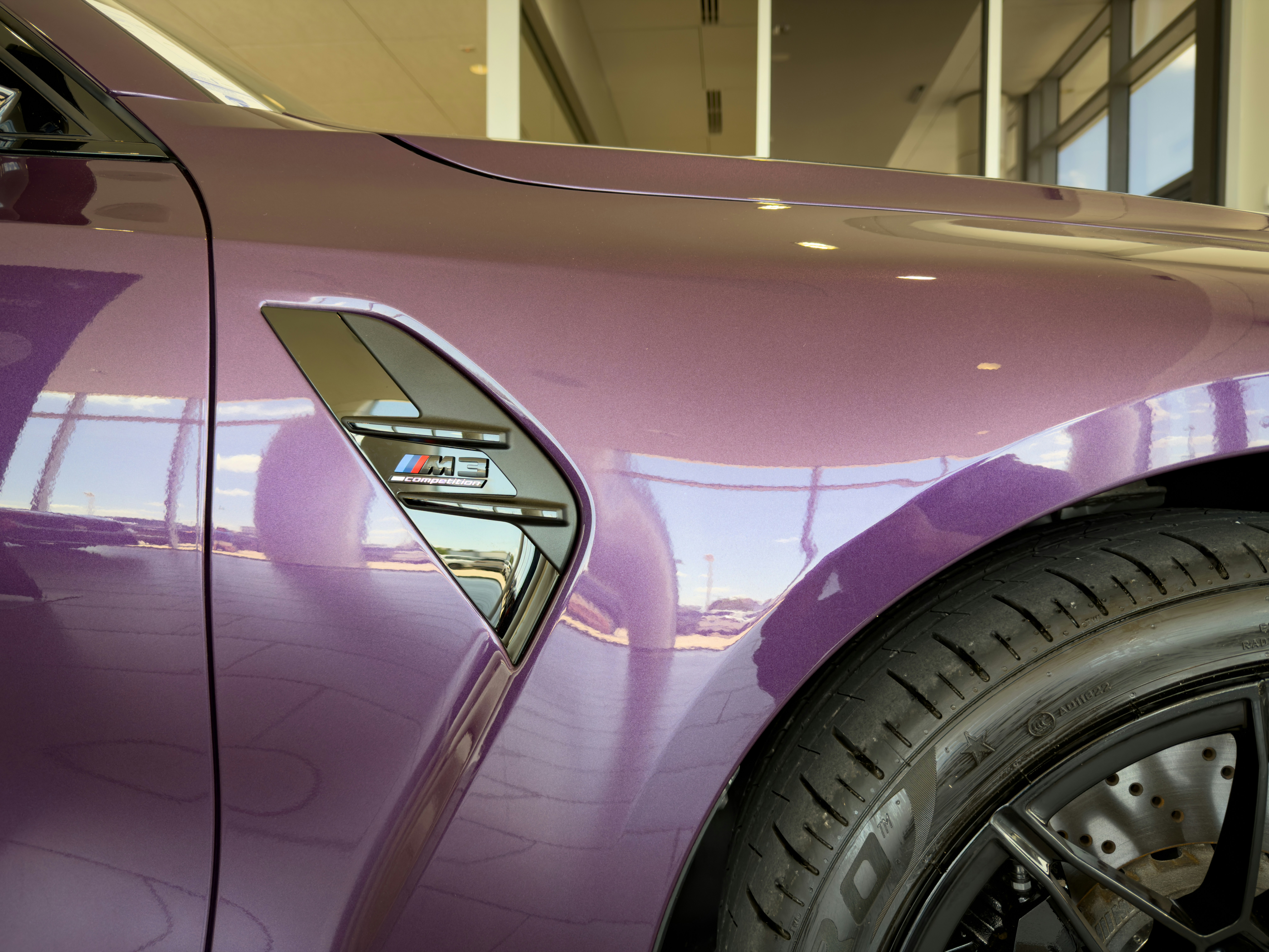 Purple M-Car: Aero Fender and Crest in Soft Studio Light