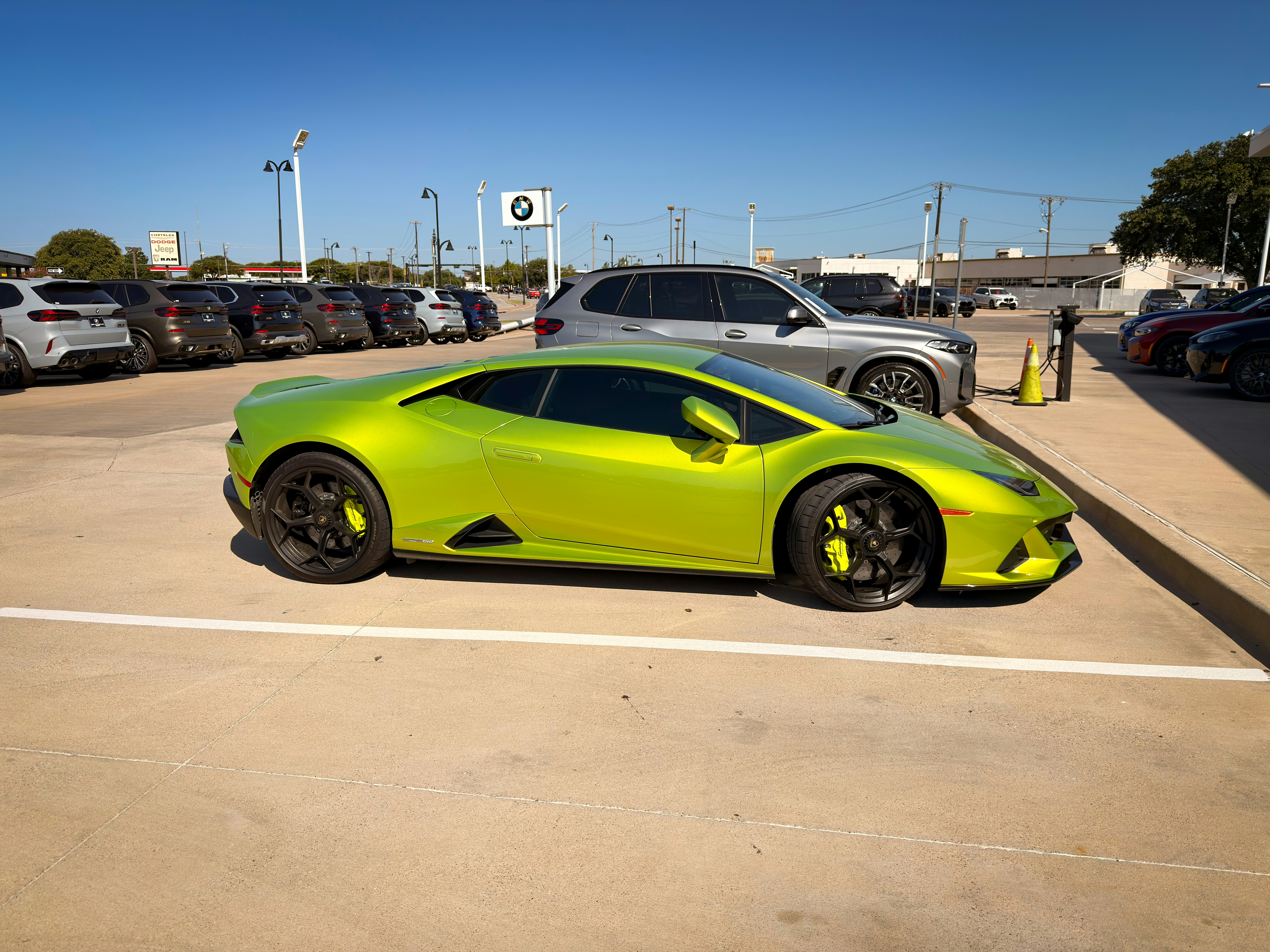 Vibrant Green Thunder: A Lamborghini Huracan Resting in the Sun