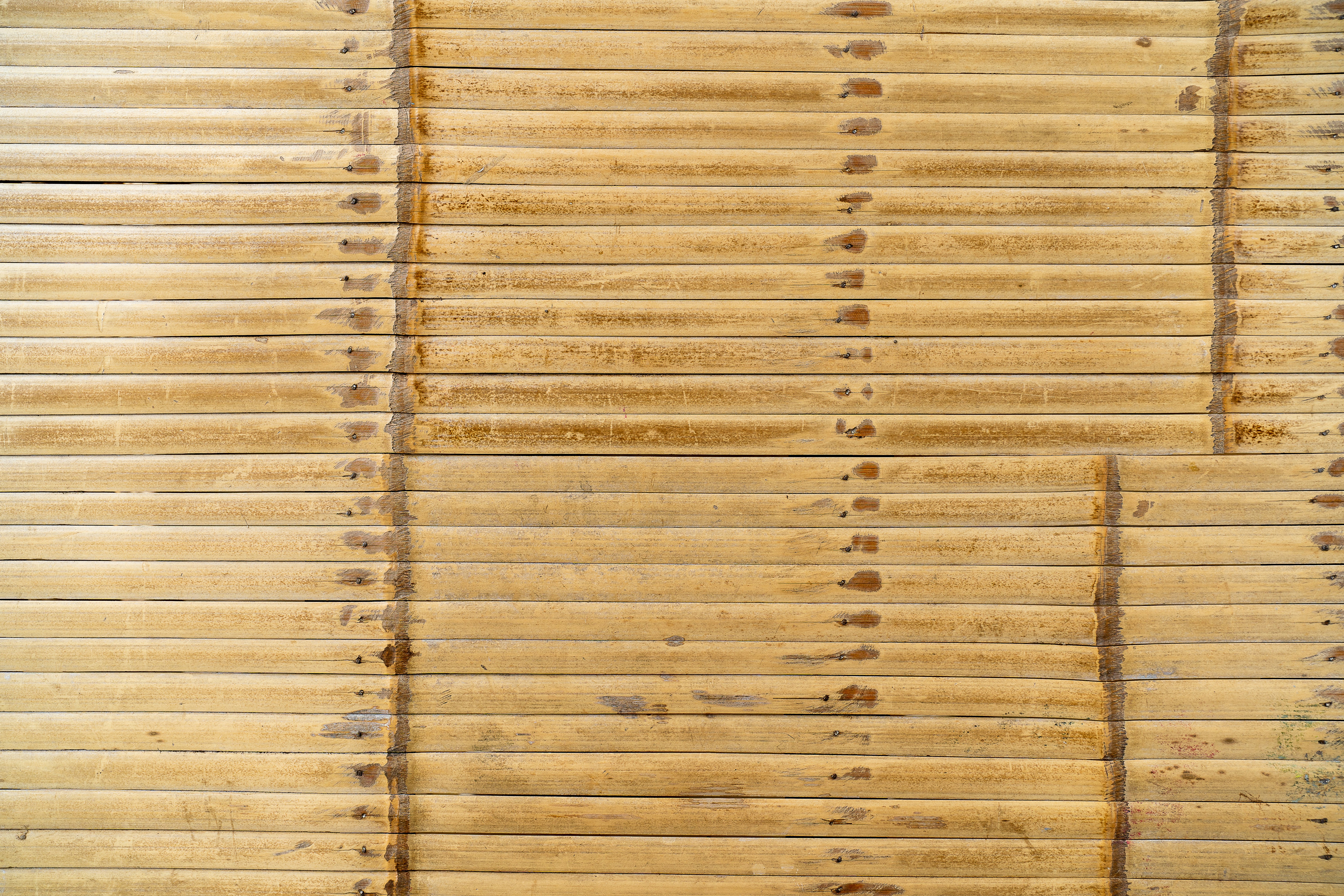 Woven Golden Planks: Repeating Lines of Weathered Wood