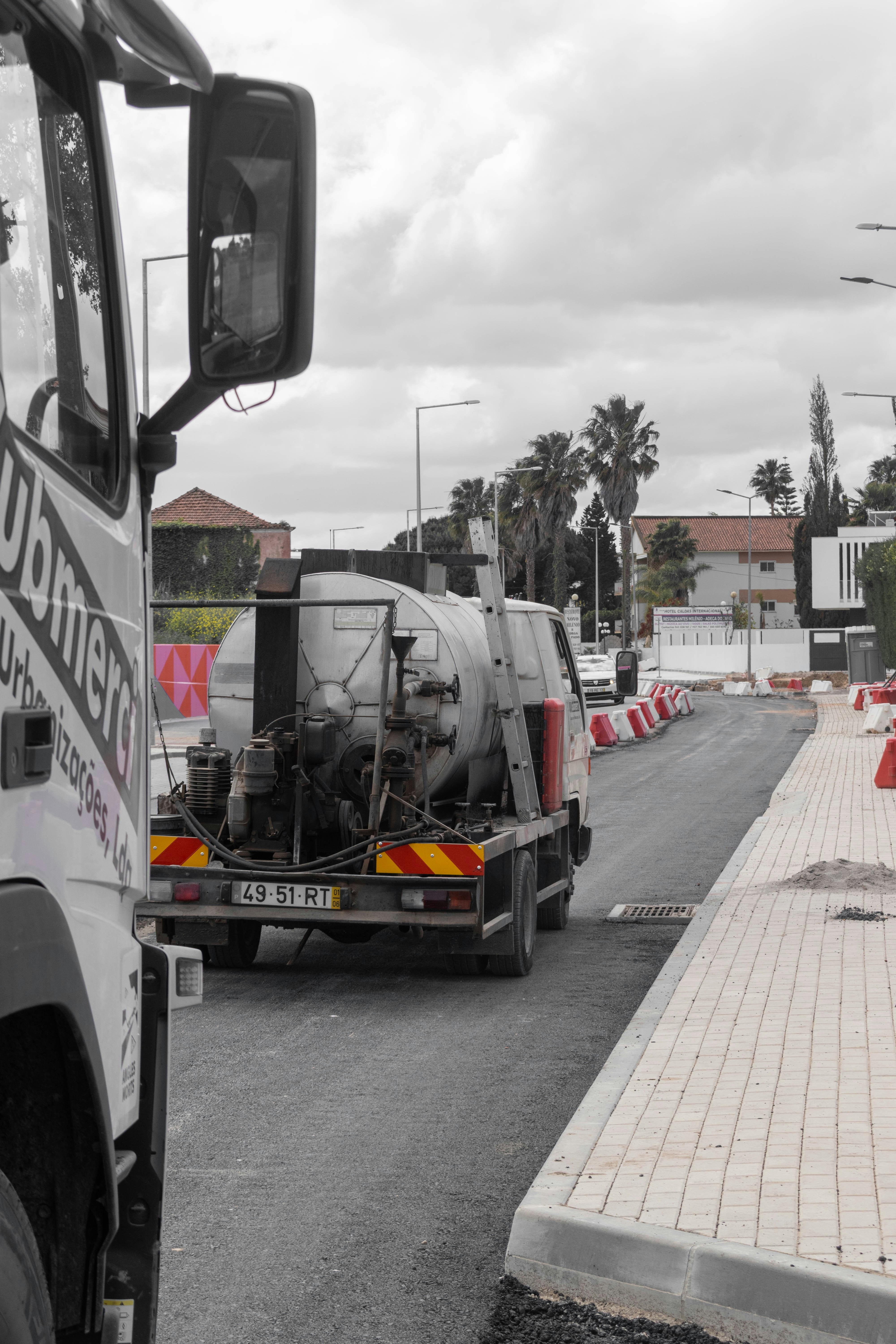 End of the Road: Construction Convoy on a Quiet Boulevard