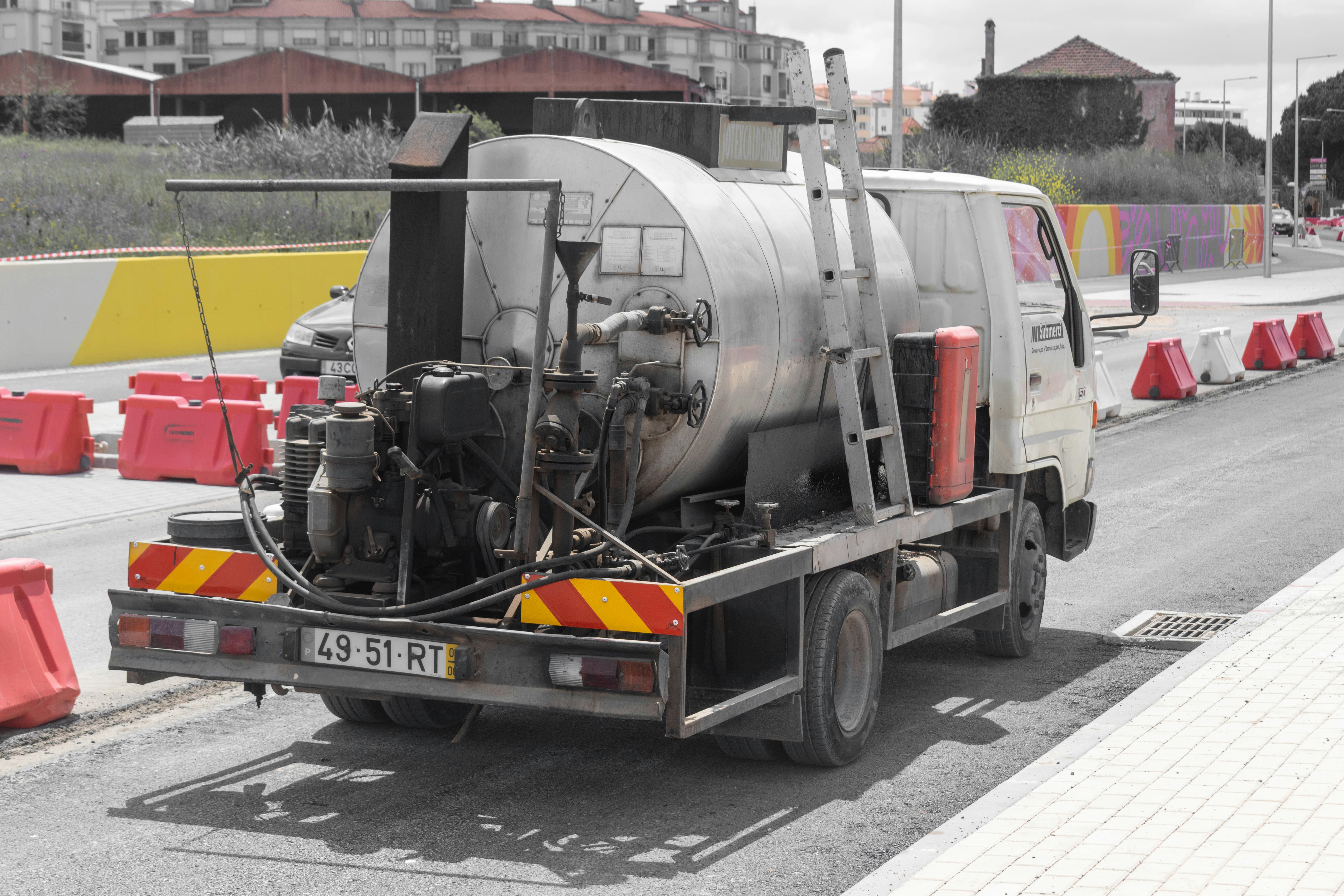Stalled Construction Truck with Concrete Mixer at a City Roadwork Site