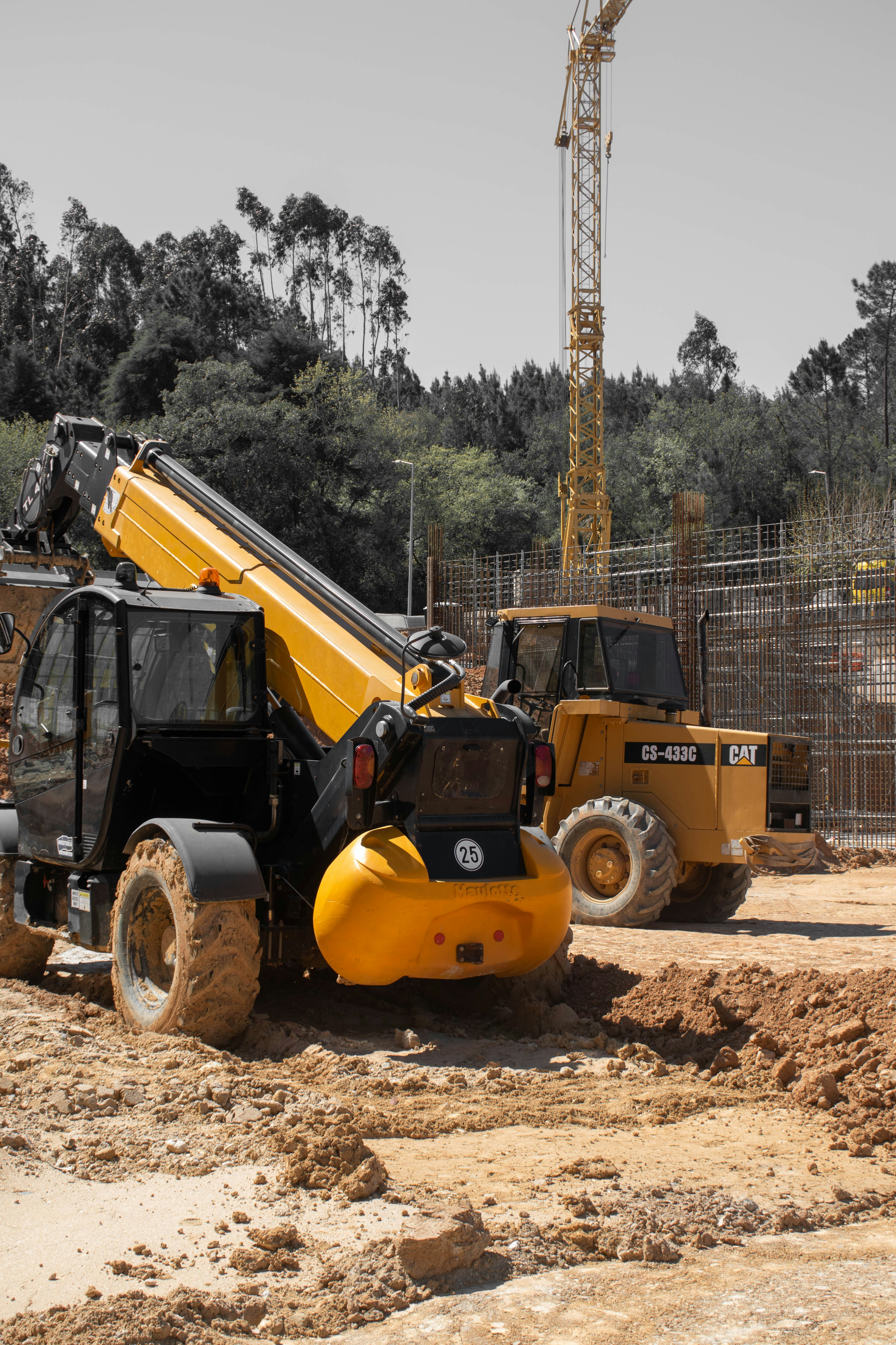 Yellow Machinery at Work: A Construction Scene Frozen in Dust