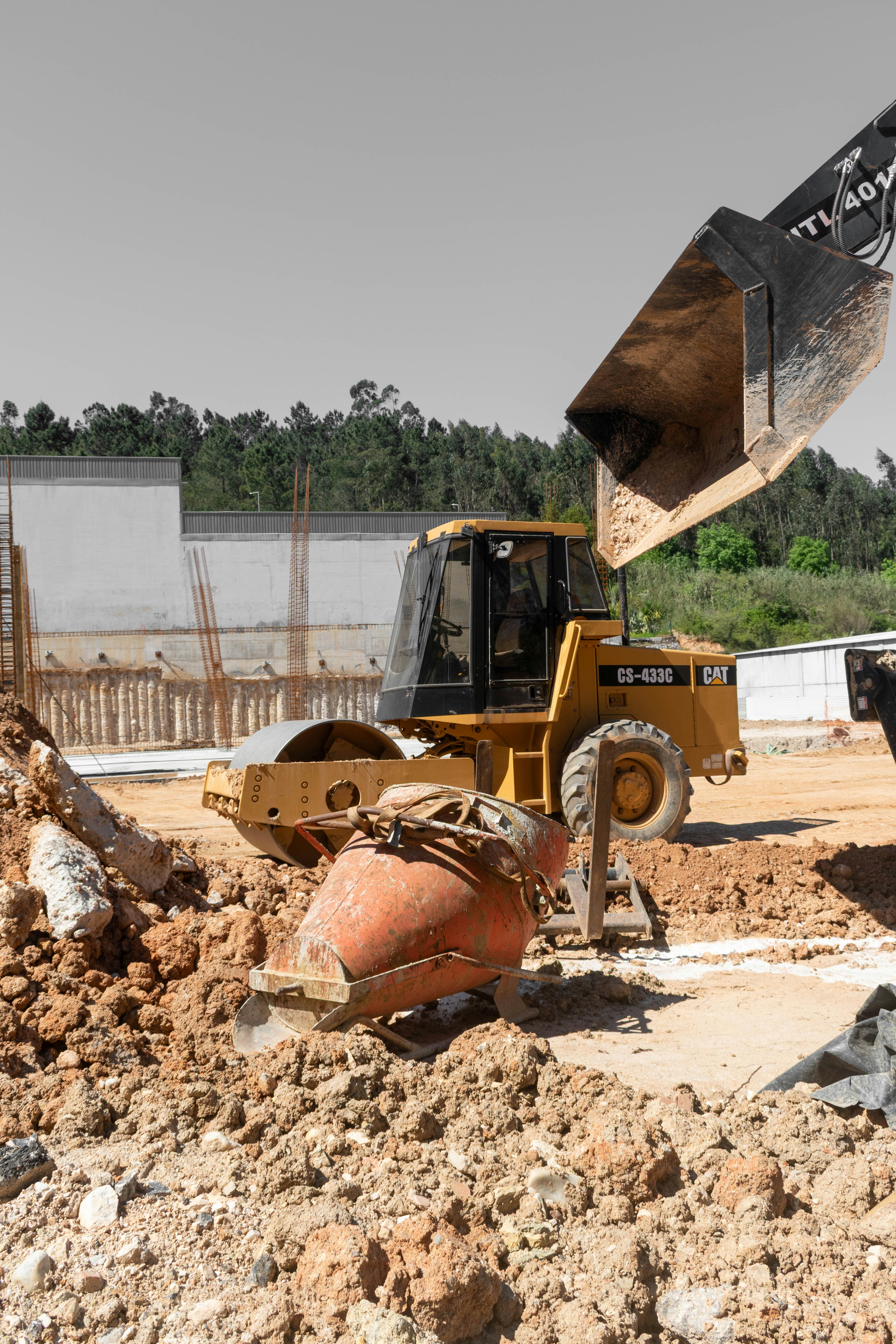 Earthmover at Work: Dumped Load and Gravel Chaos