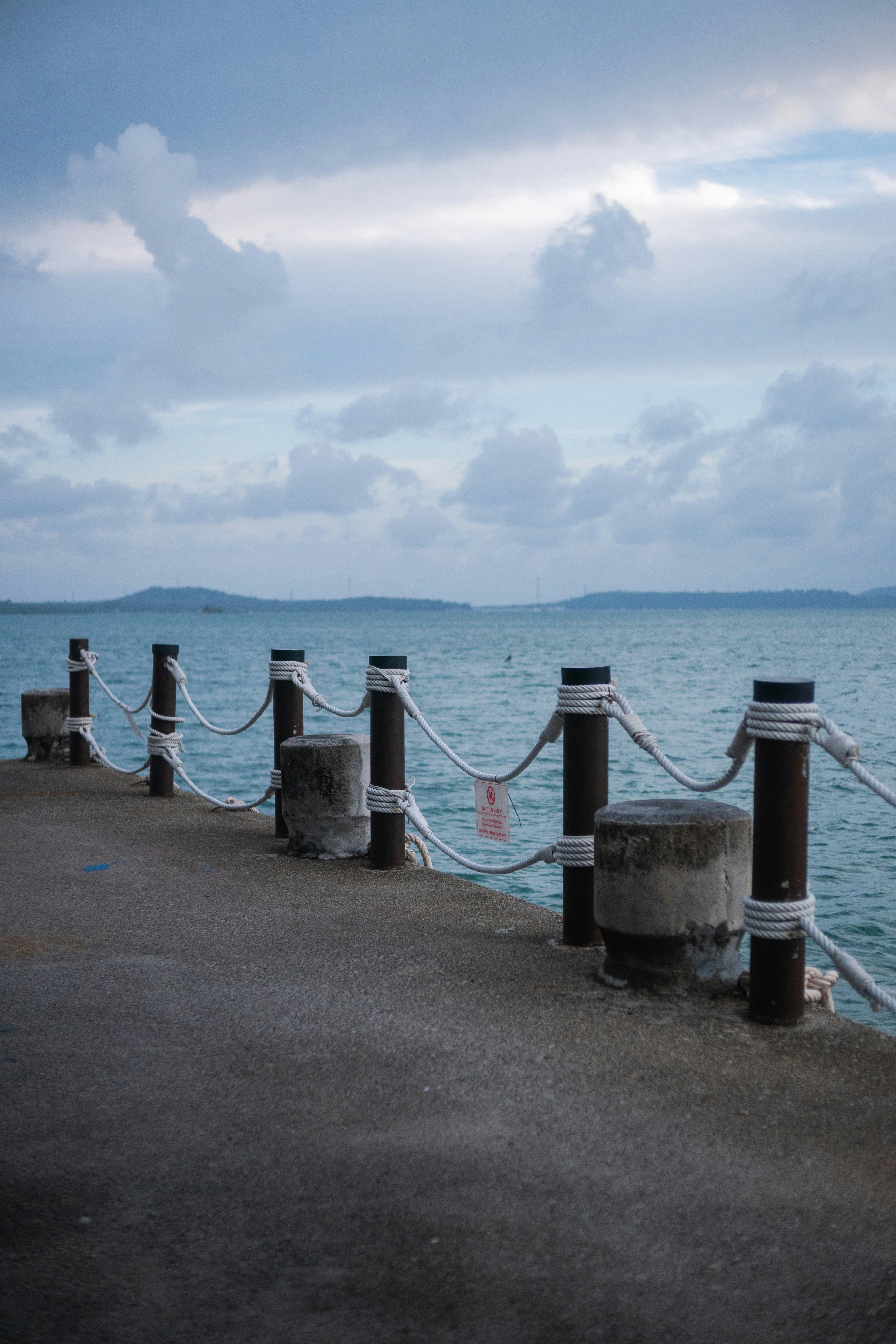 Rope-lined Promenade Overlooking a Serene Sea