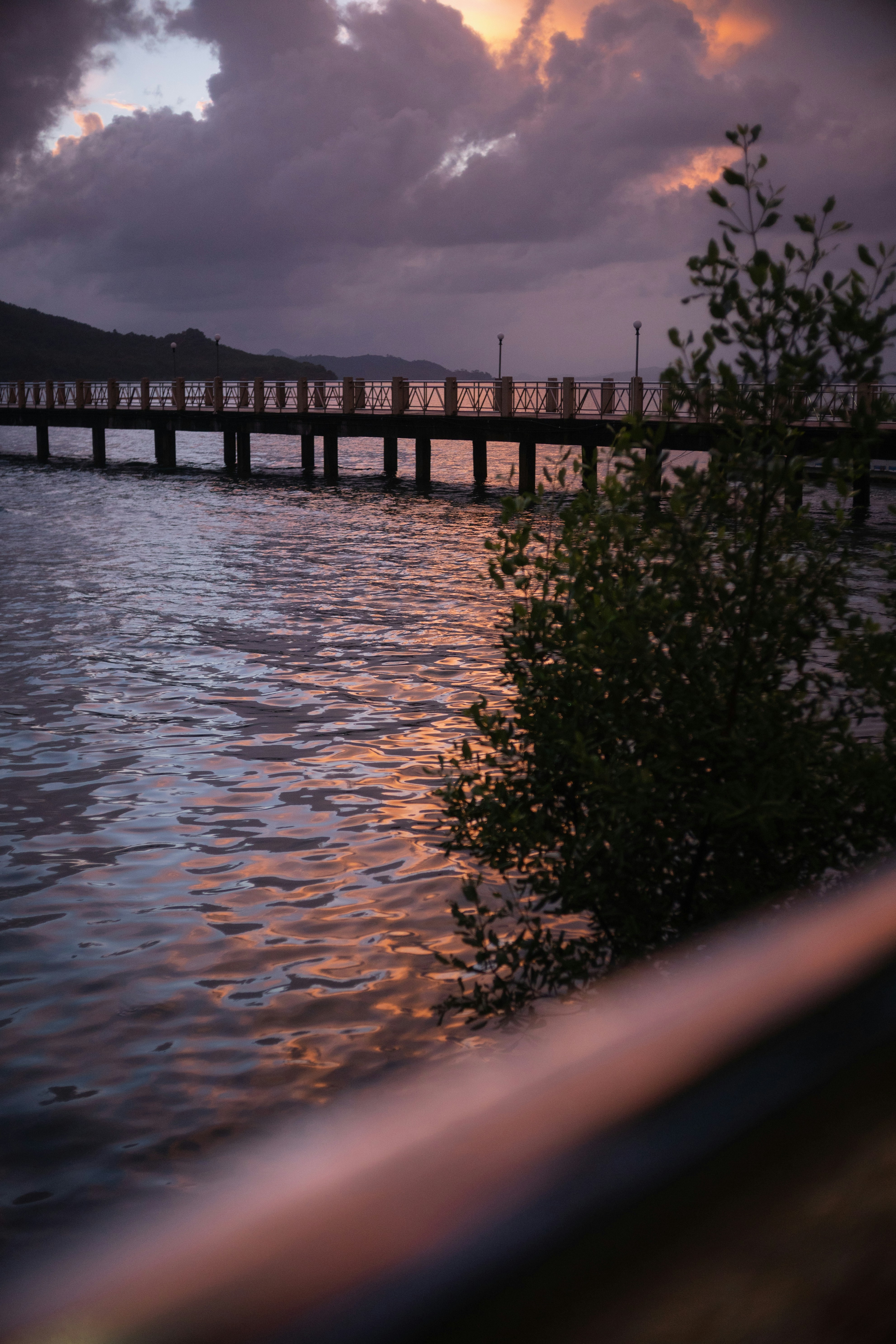 Sunset Pier Reverie Over Calm Waters