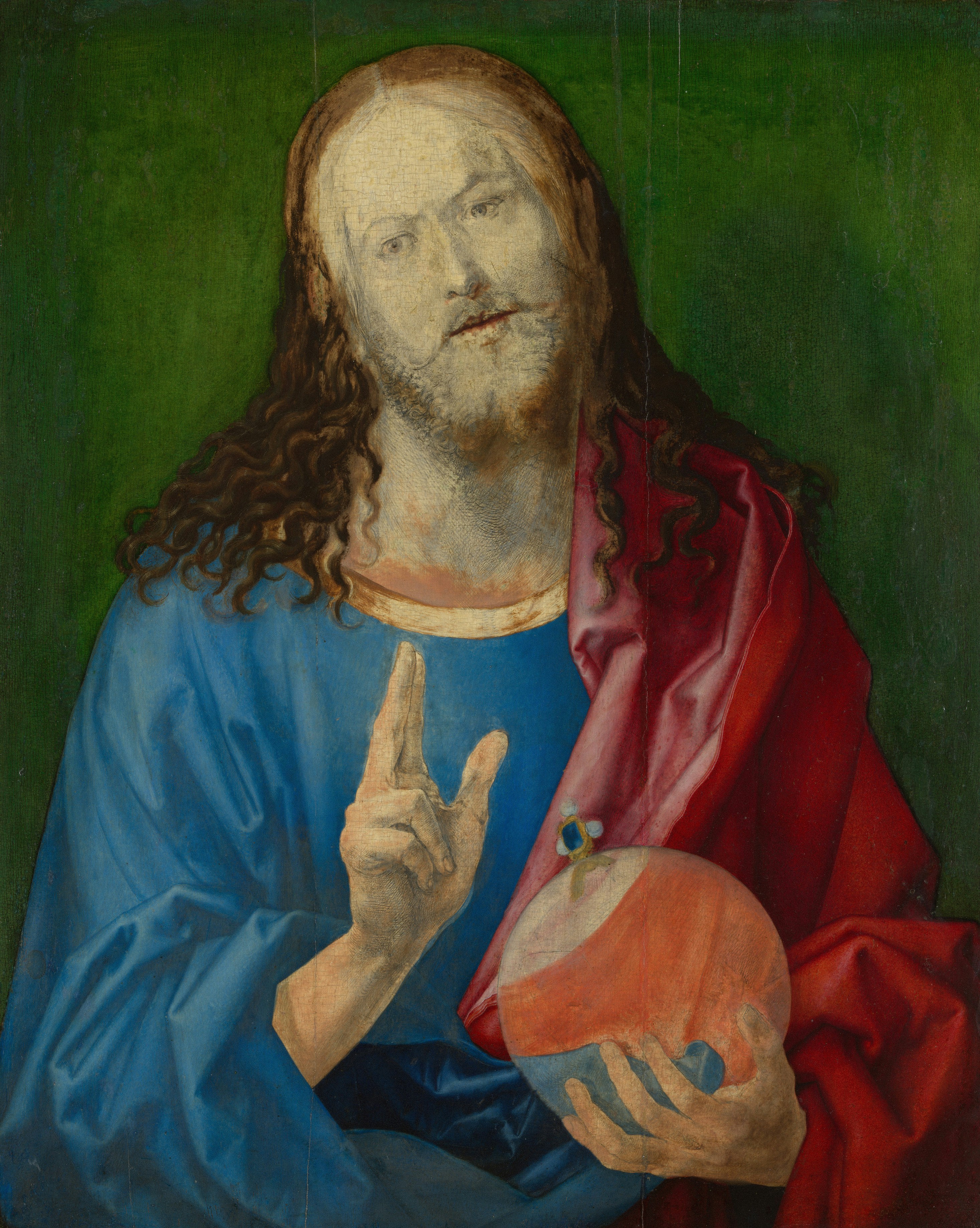 Serene blessing: Christ with raised finger and orb in a green-lit portrait