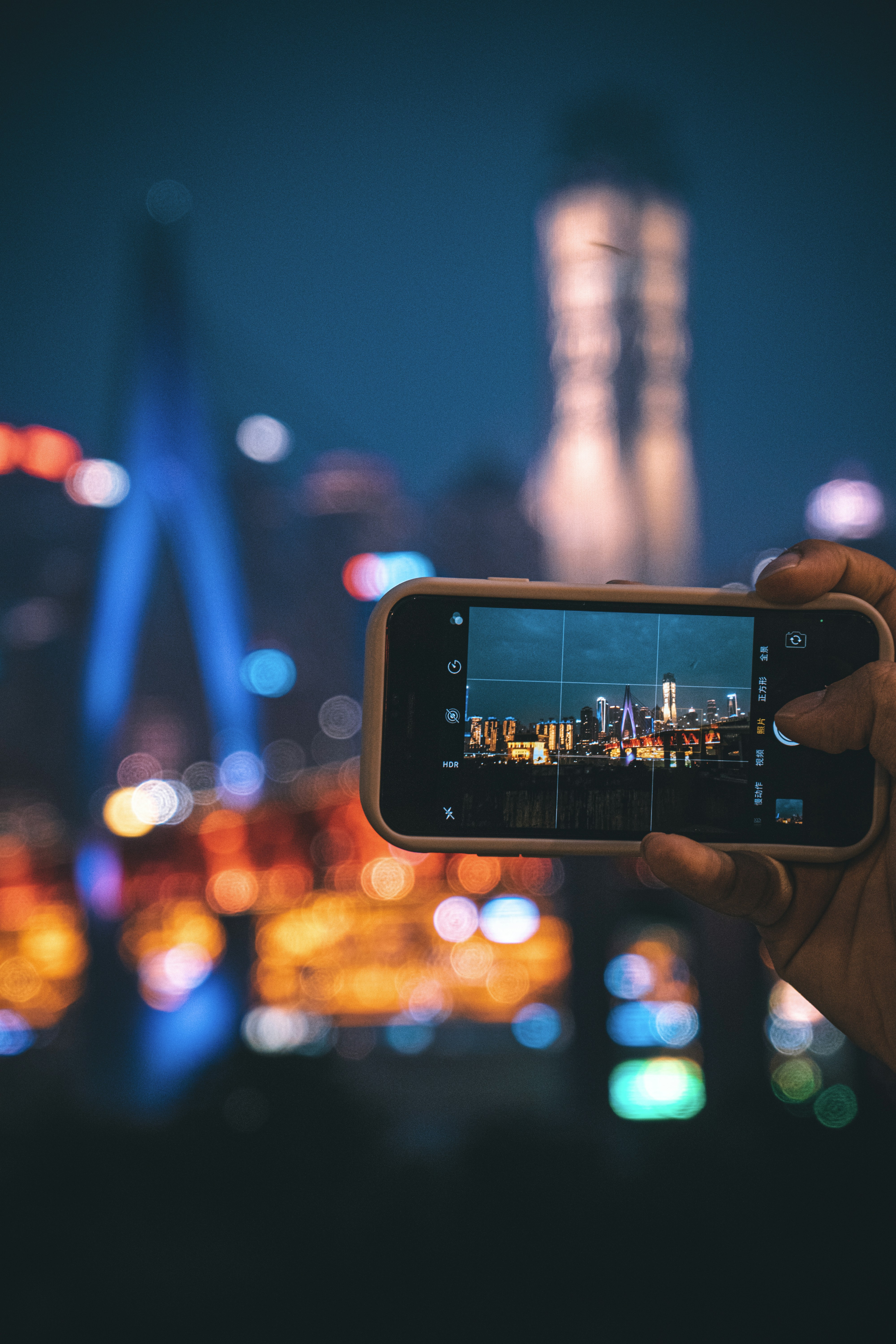 City Lights through a Phone Screen: A Night Snapshot in Focus