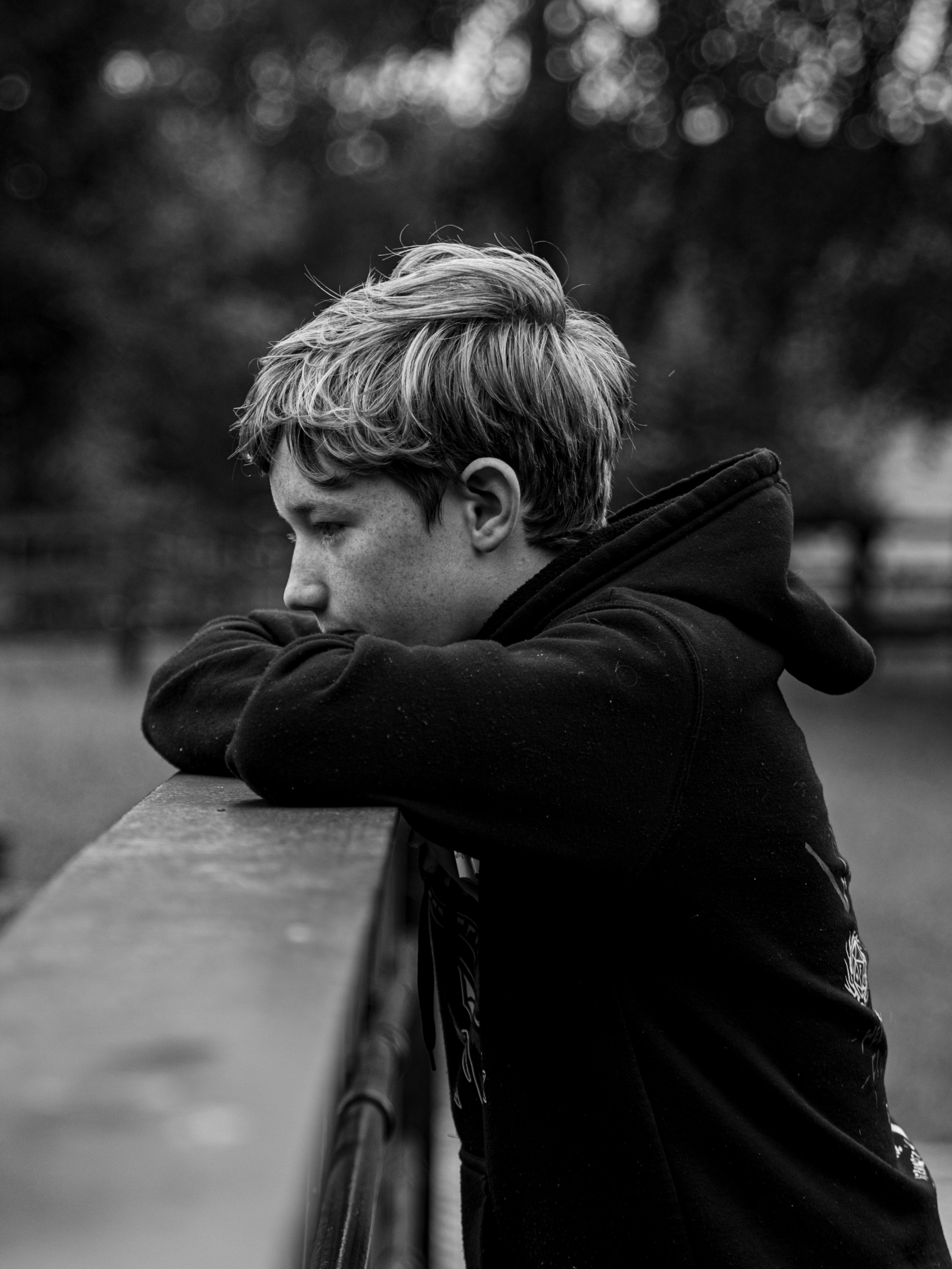 Beyond the Edge: Quiet Introspection on a Park Fence