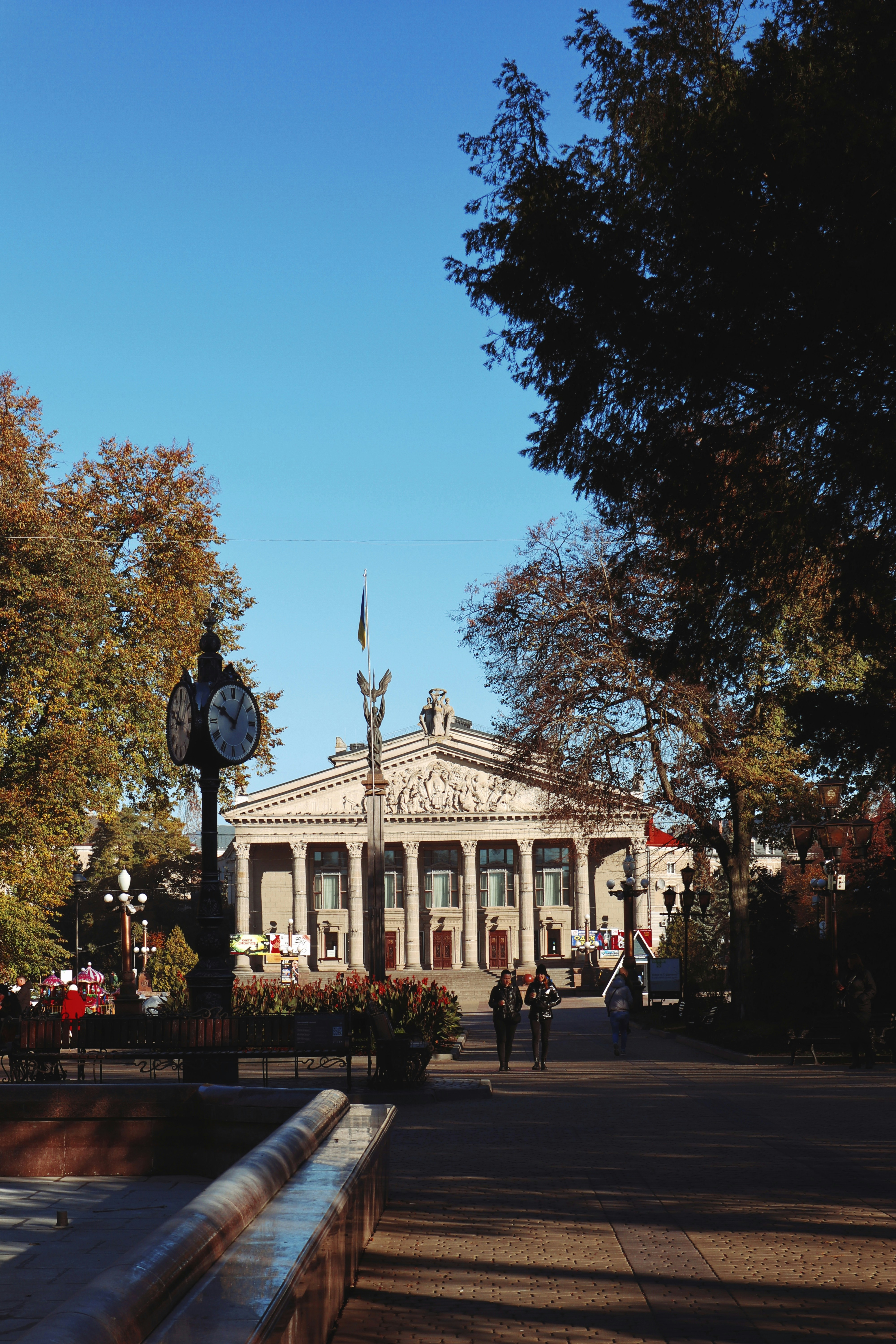 Court of Echoes: Neoclassical Facade Under Autumn Sky