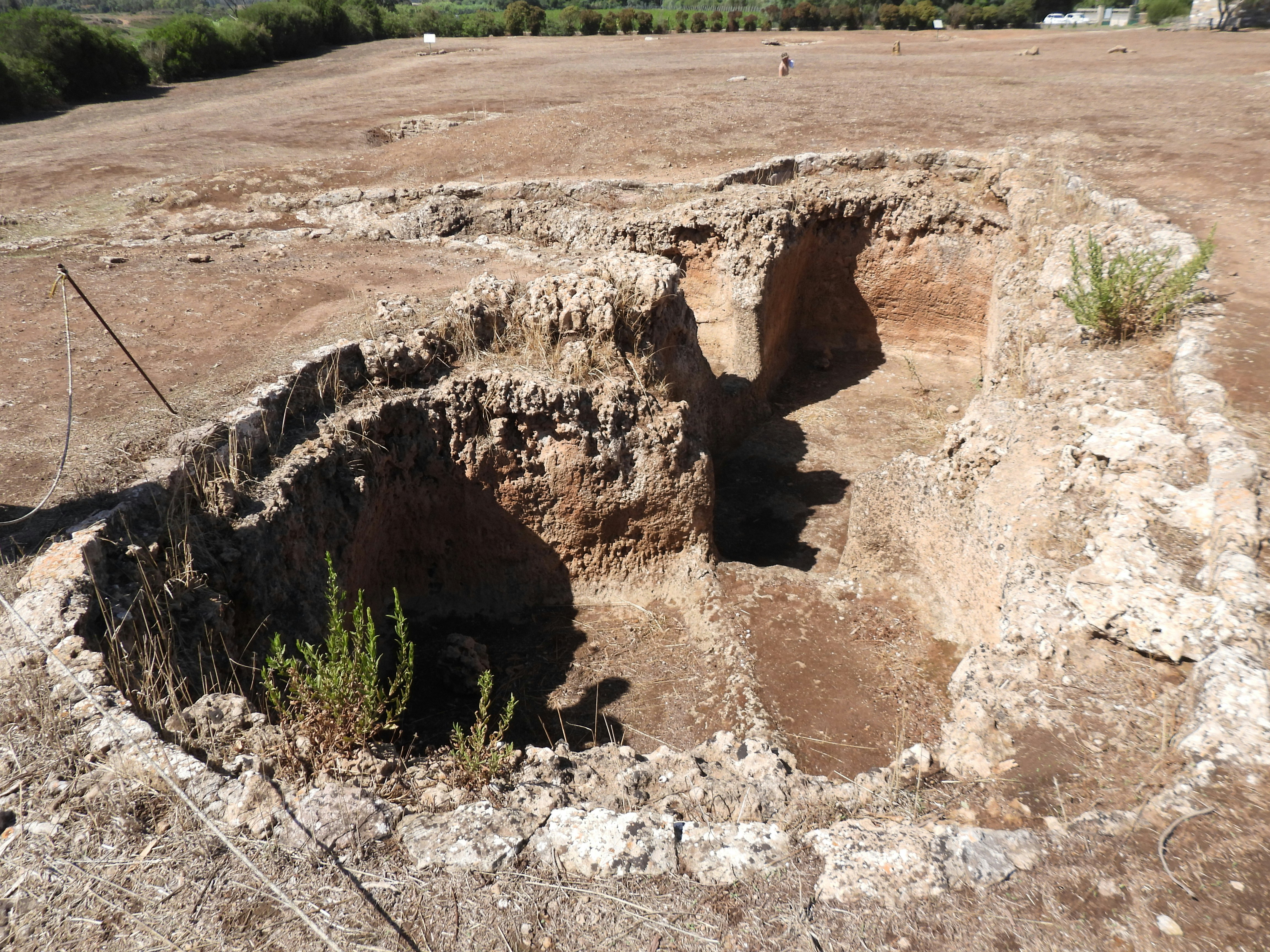 Archaeological Excavation: Emptied trench revealing stratified earth