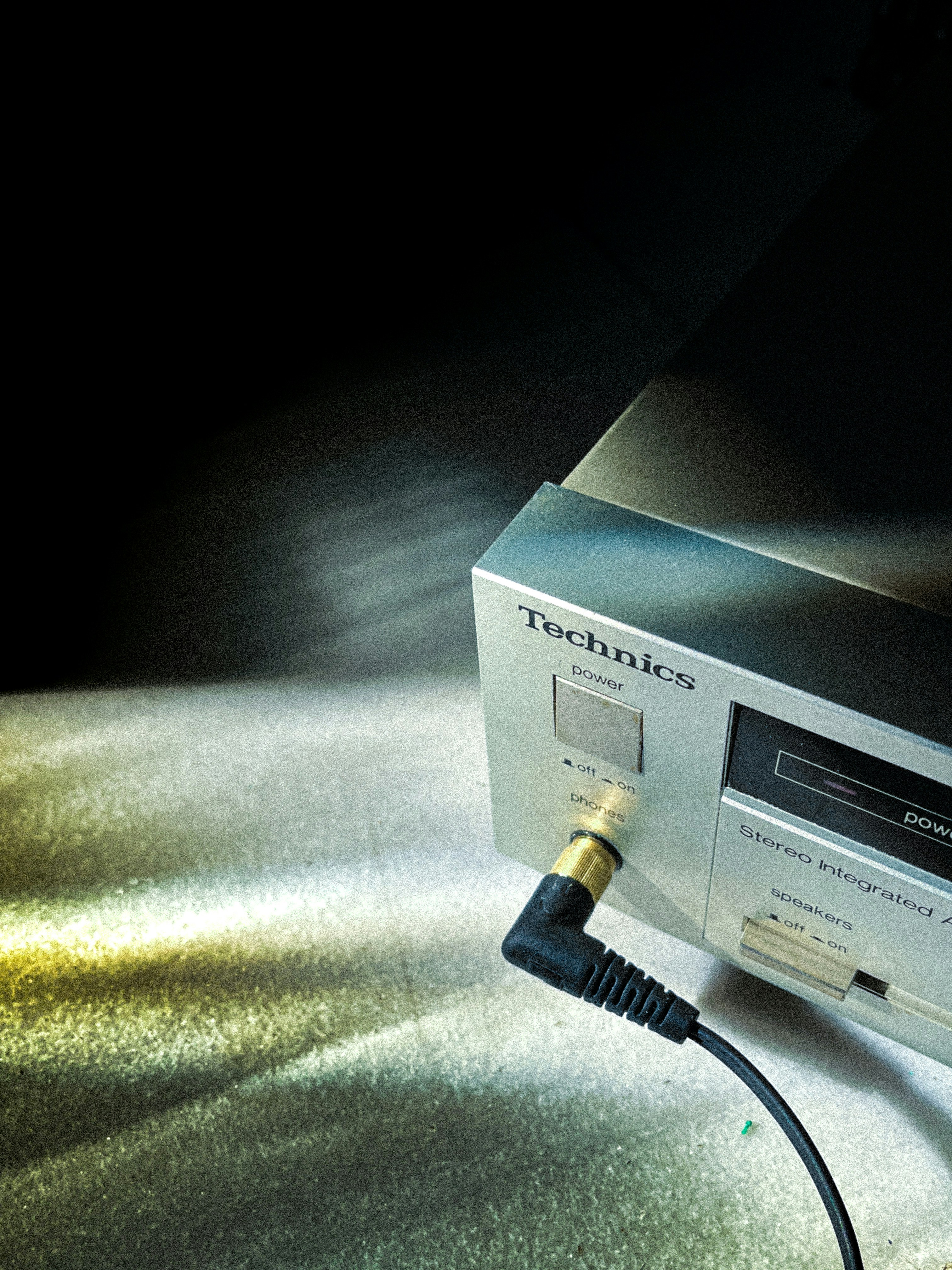 Retro Receiver Under Dim Spotlight