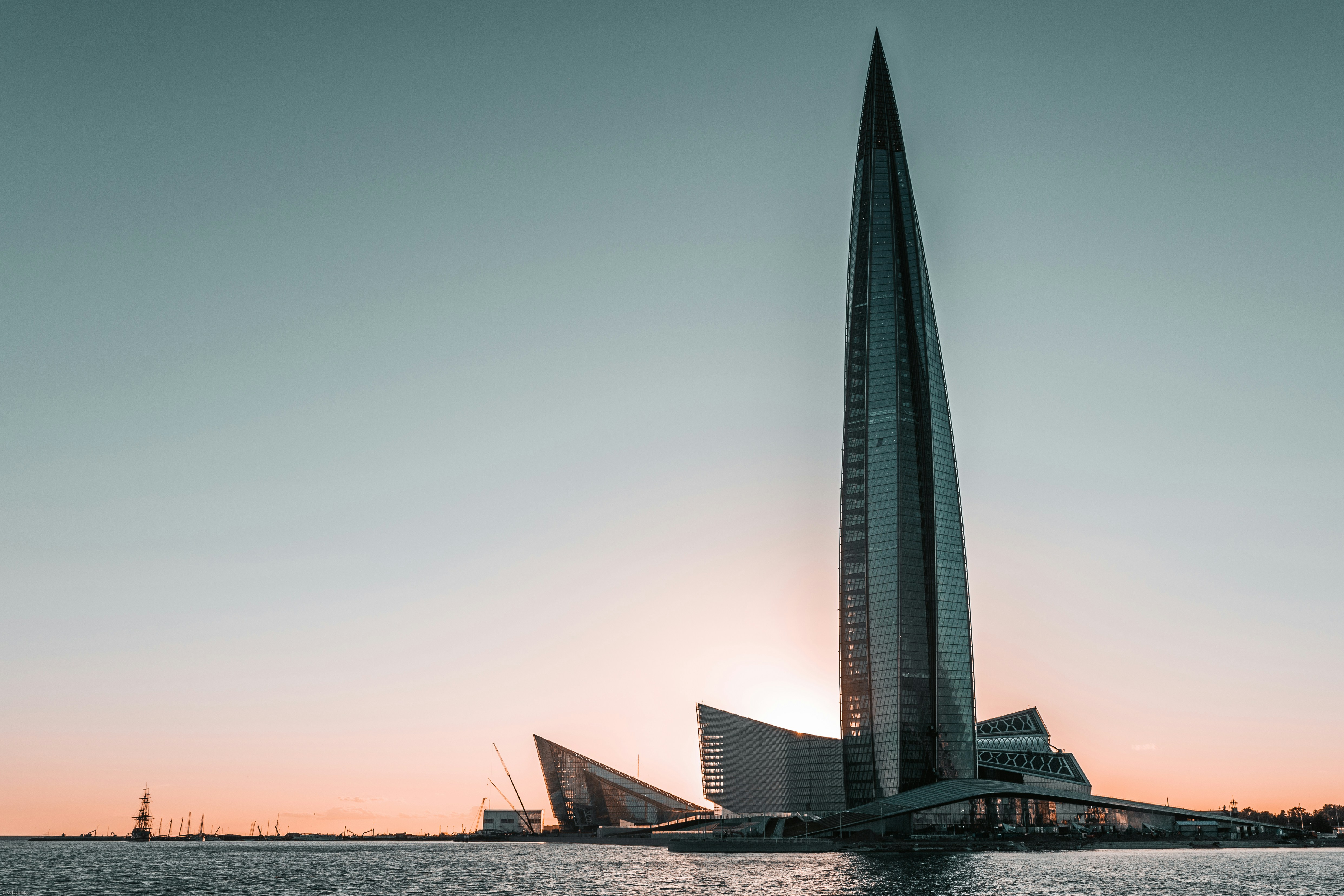 Sleek Marina silhouette: The city’s spire rising above tranquil harbor