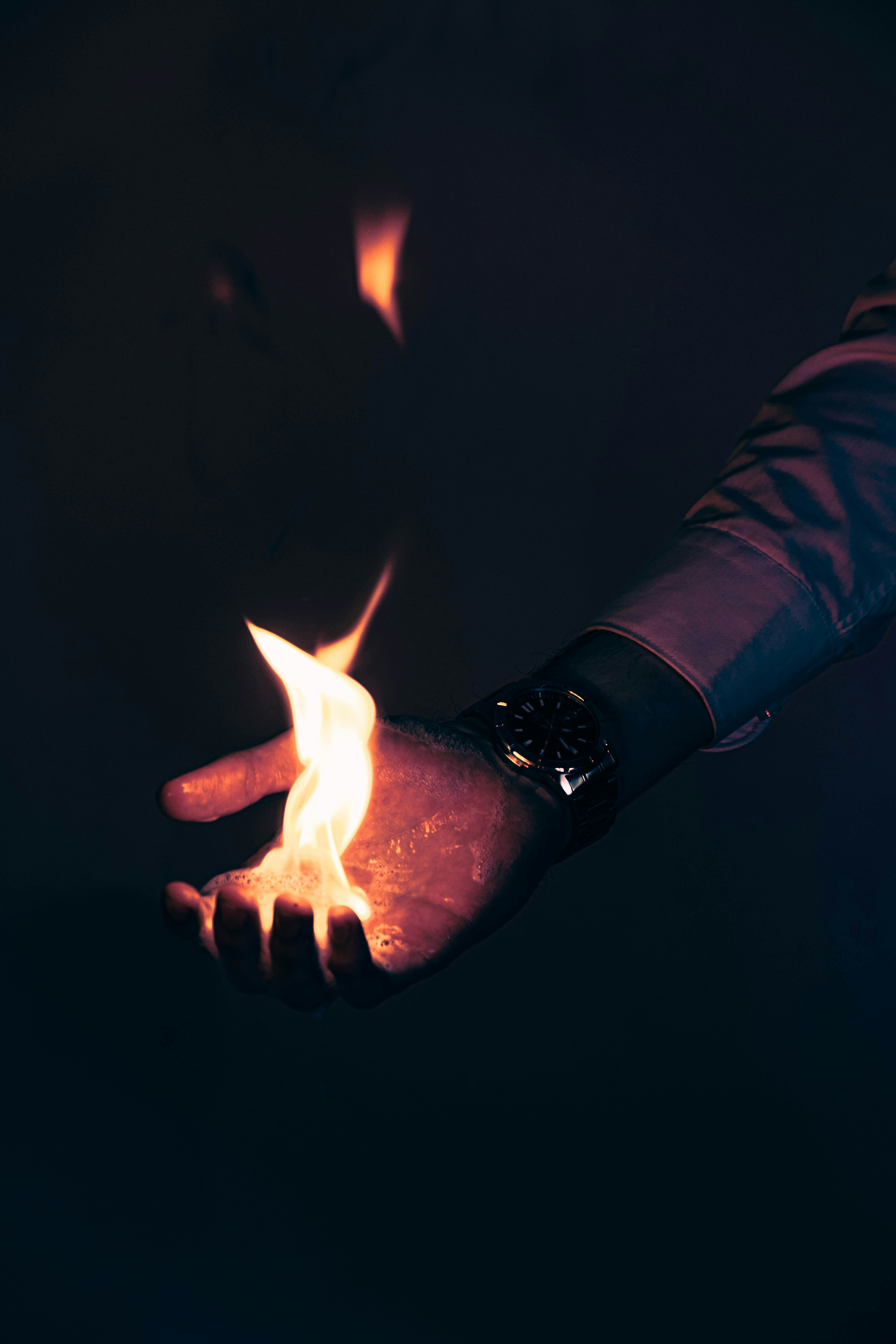 Flame in Hand: A Quiet Burst of Heat