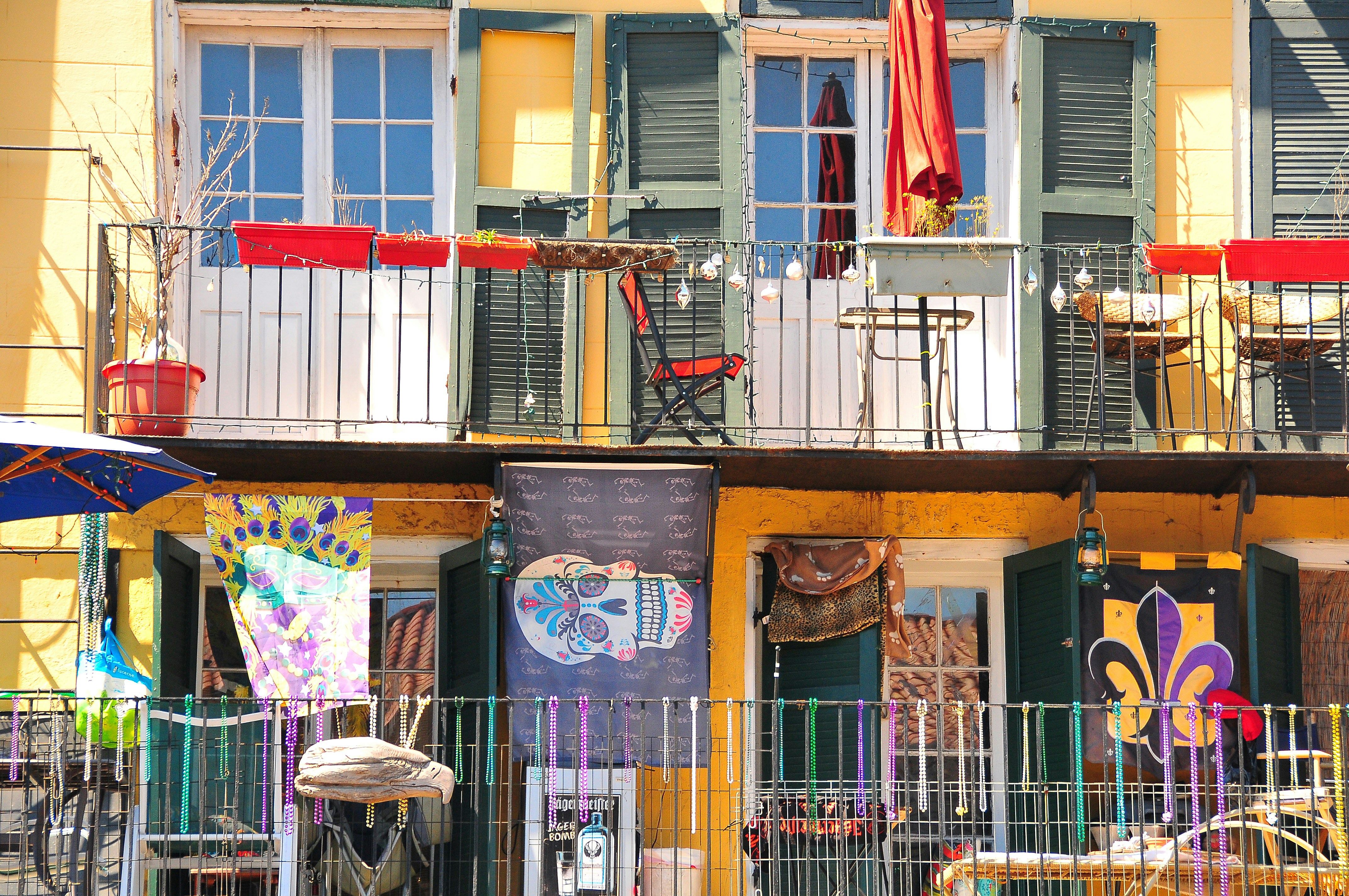 Balcony Gallery: A Sunlit Facade of Colorful Expression