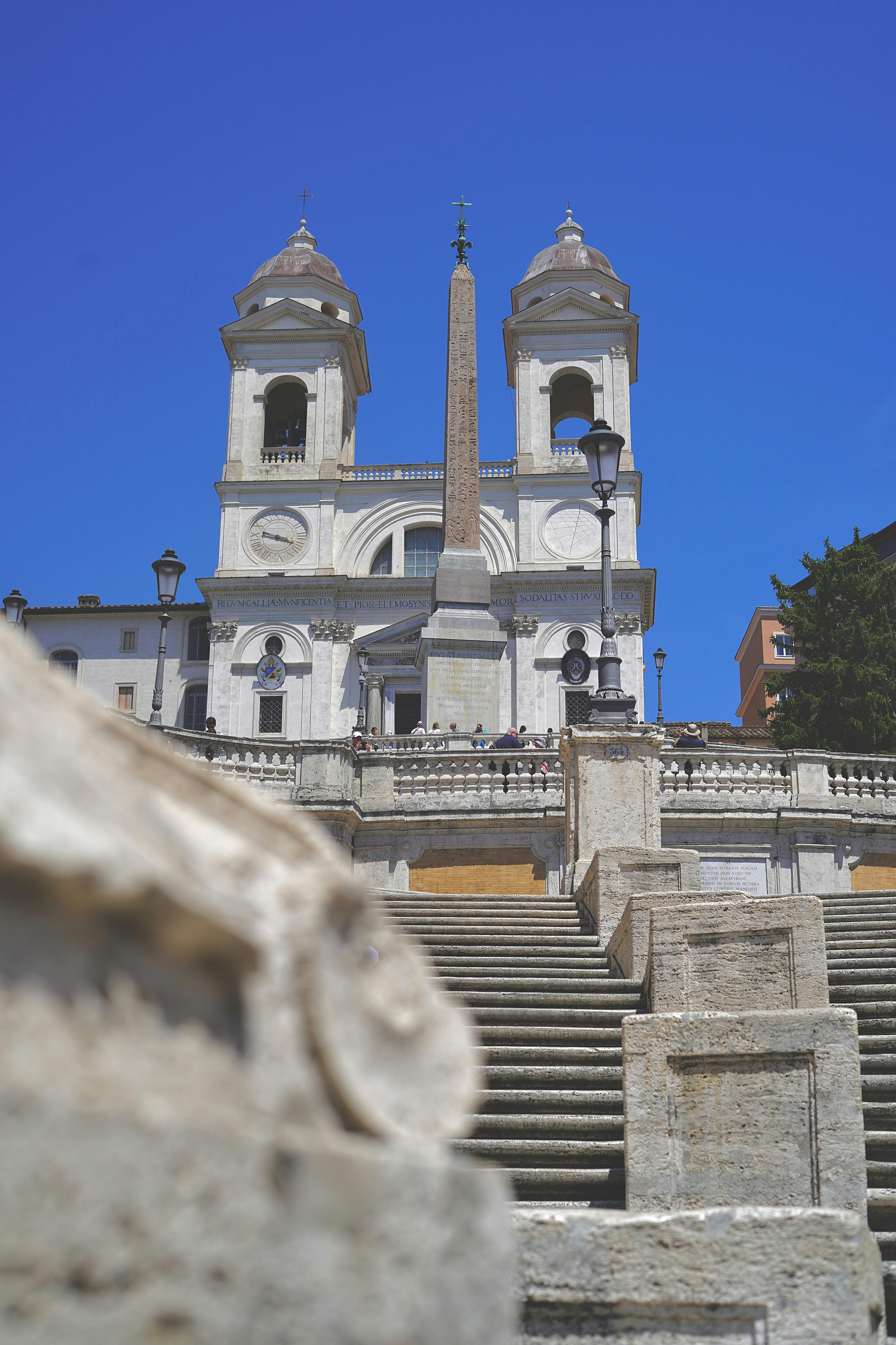 Rising Obelisk and Baroque Facade: Steps Toward the Basilica