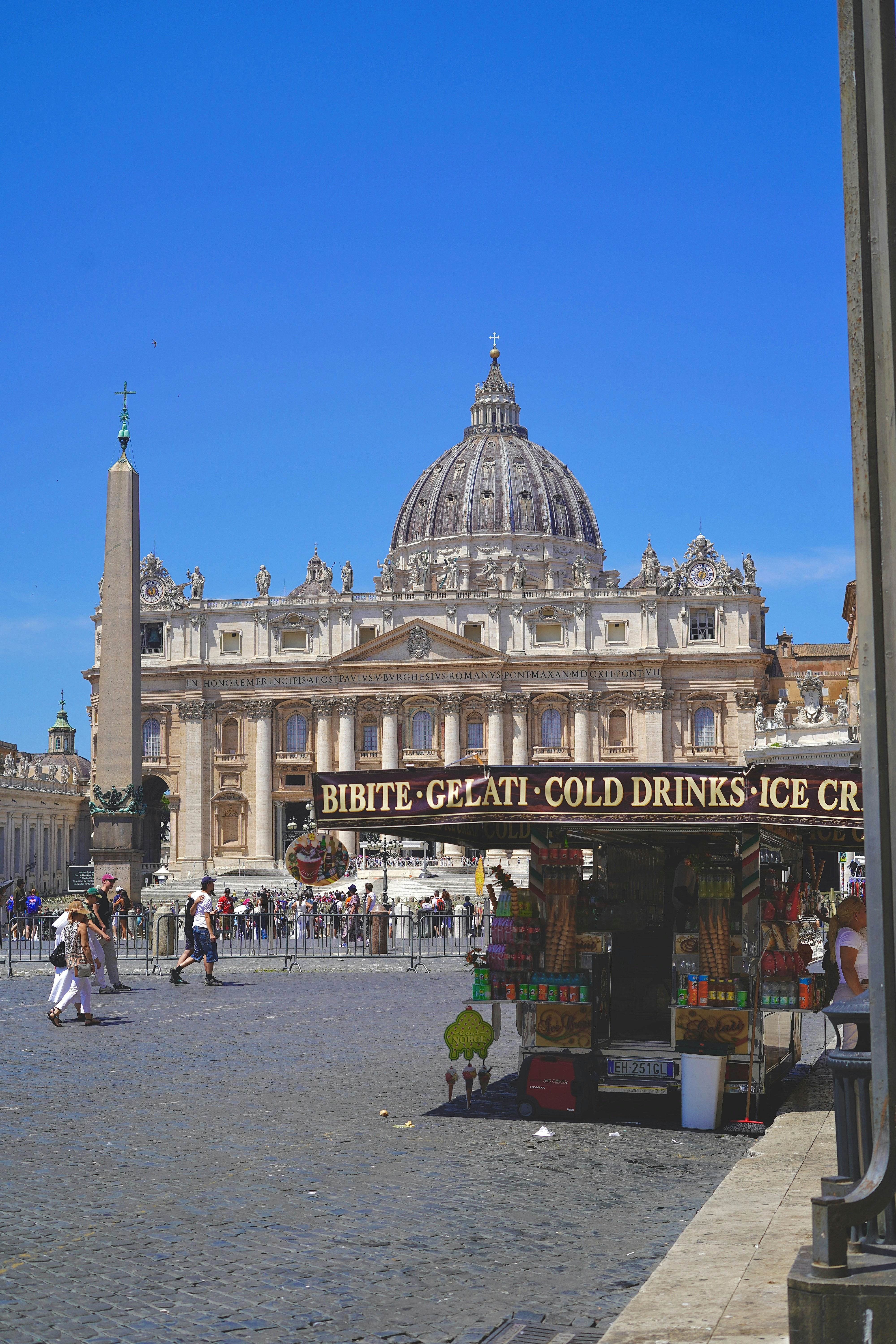 St. Peter's Basilica Courtyard with a Colorful Street Stall