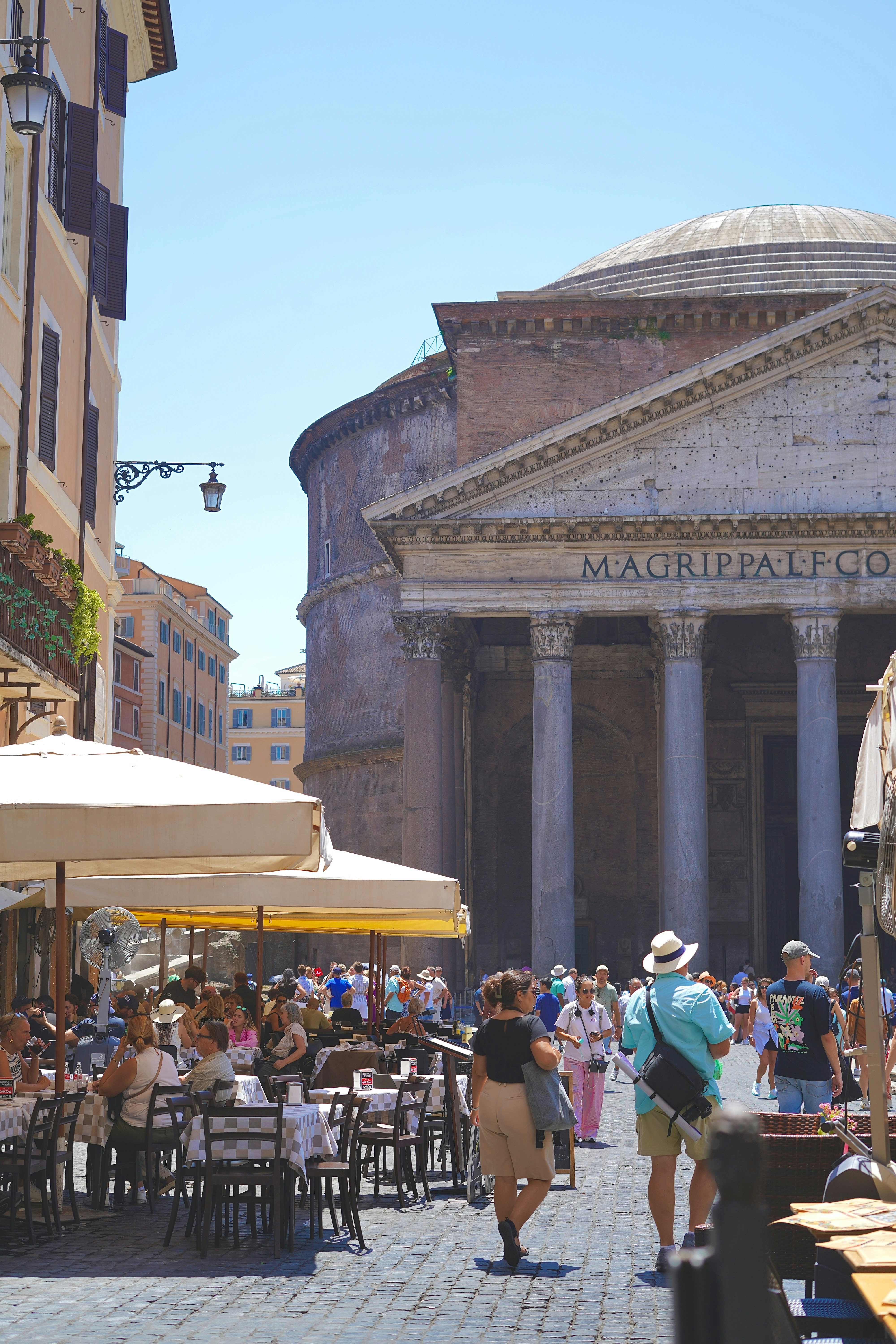 Temple Facade Beneath a Crowded Piazza