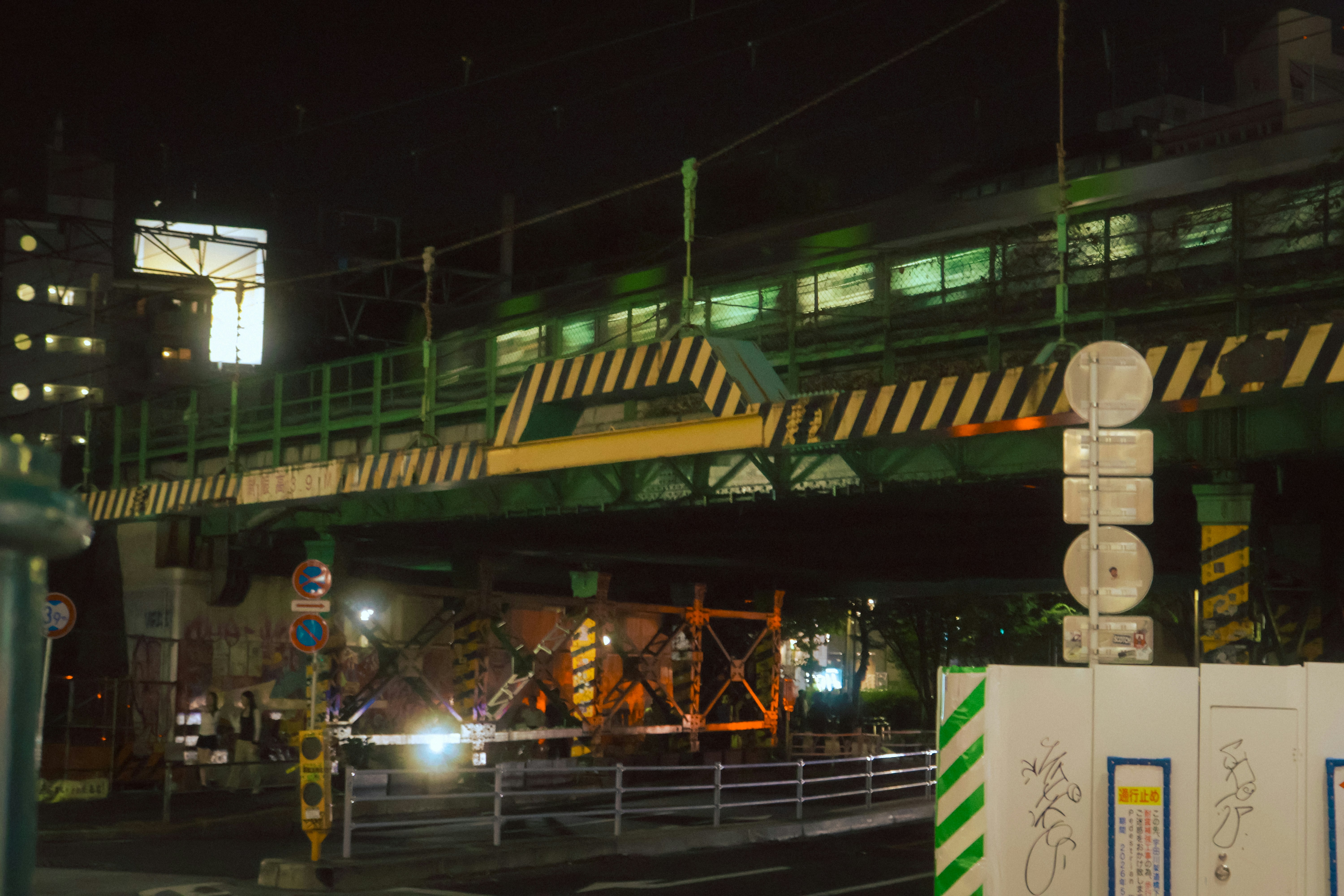 Night Shift Overpass: Neon Rails and Painted Barriers