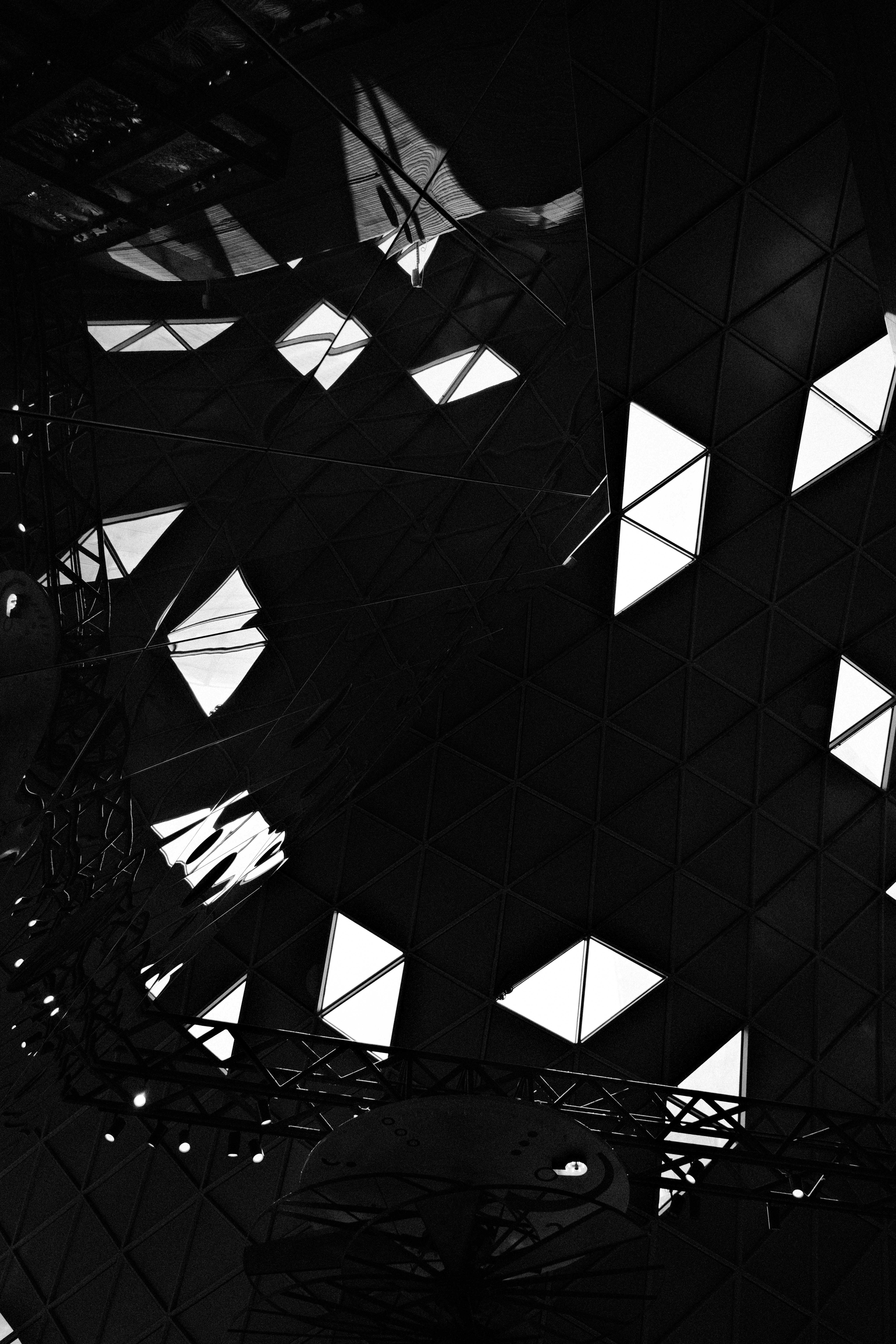 Geometric Echoes: A Dark Facade of Light and Lattice