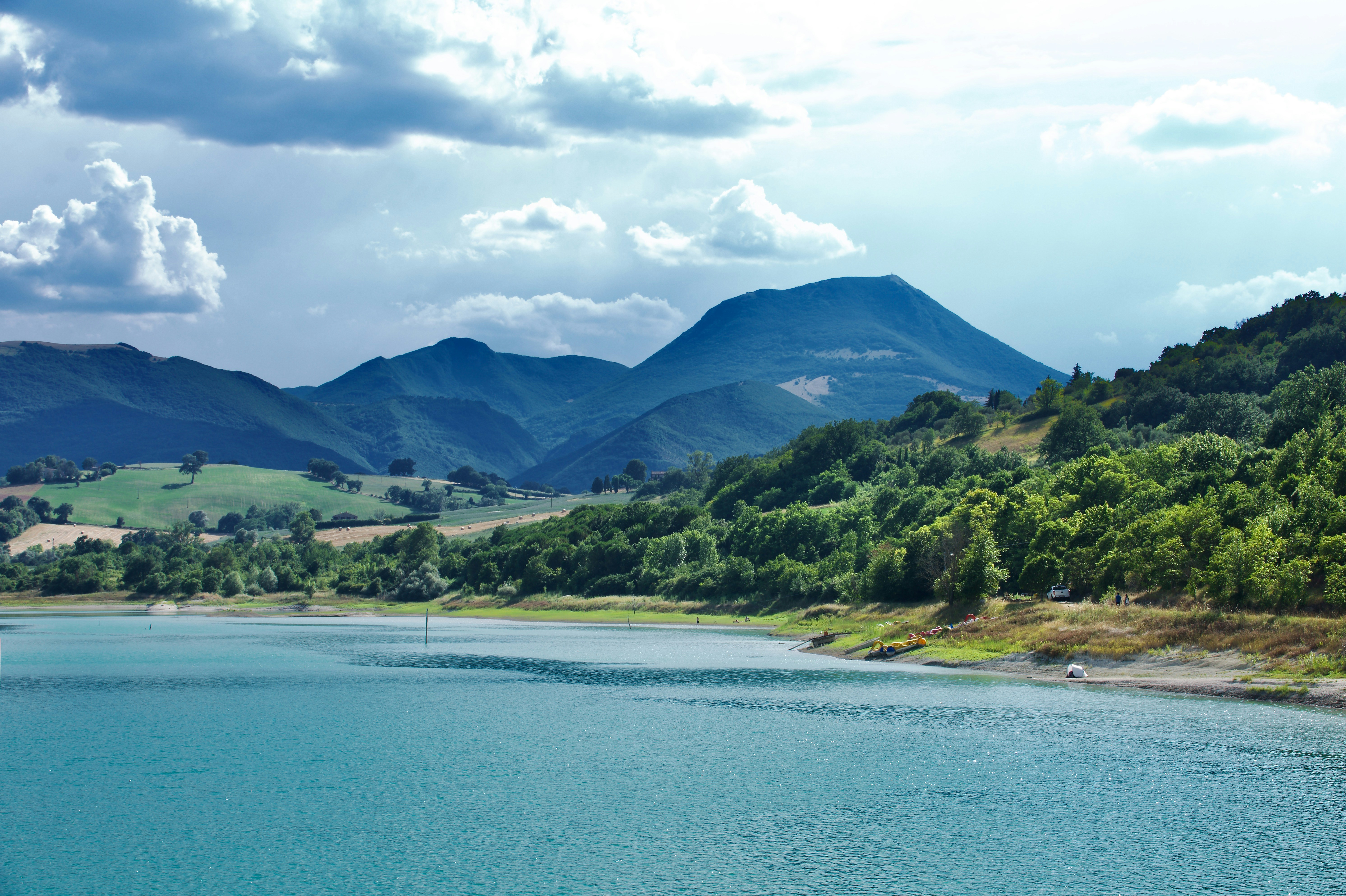 Luminous Coastline Quietly Embraced by Rolling Hills