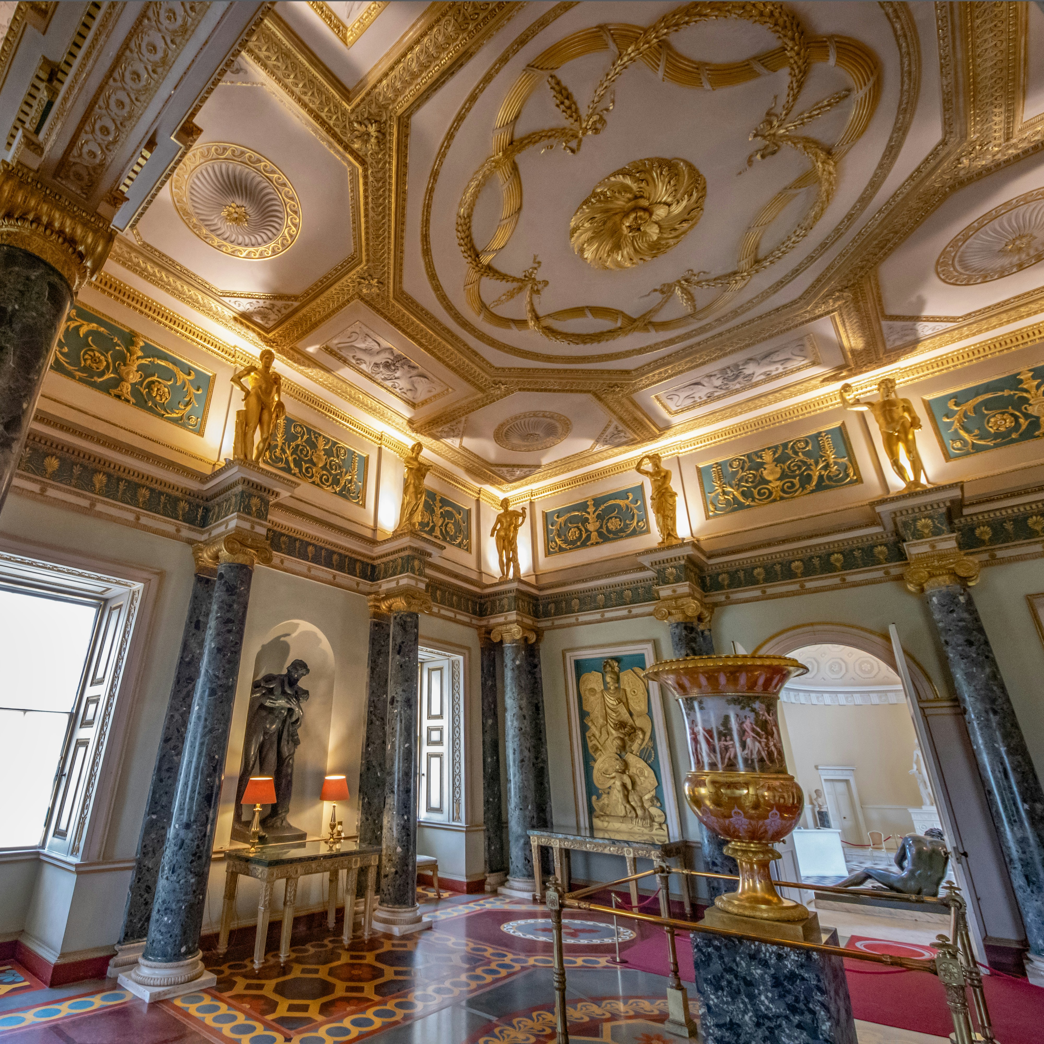Opulent Salon: Golden Ceilings and Marble Columns