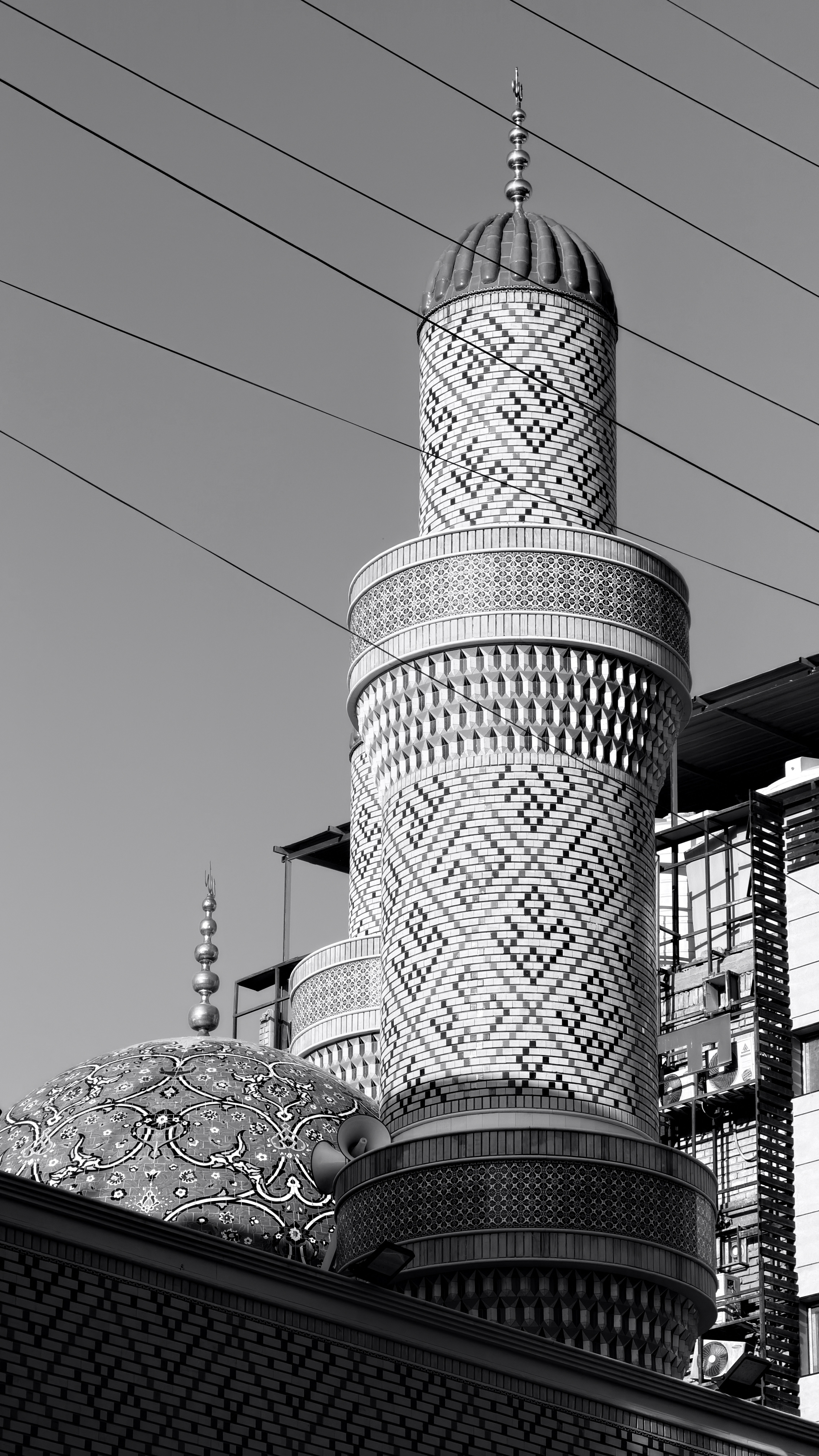 The incredible, intricate brickwork details on this minaret in Iraq.
