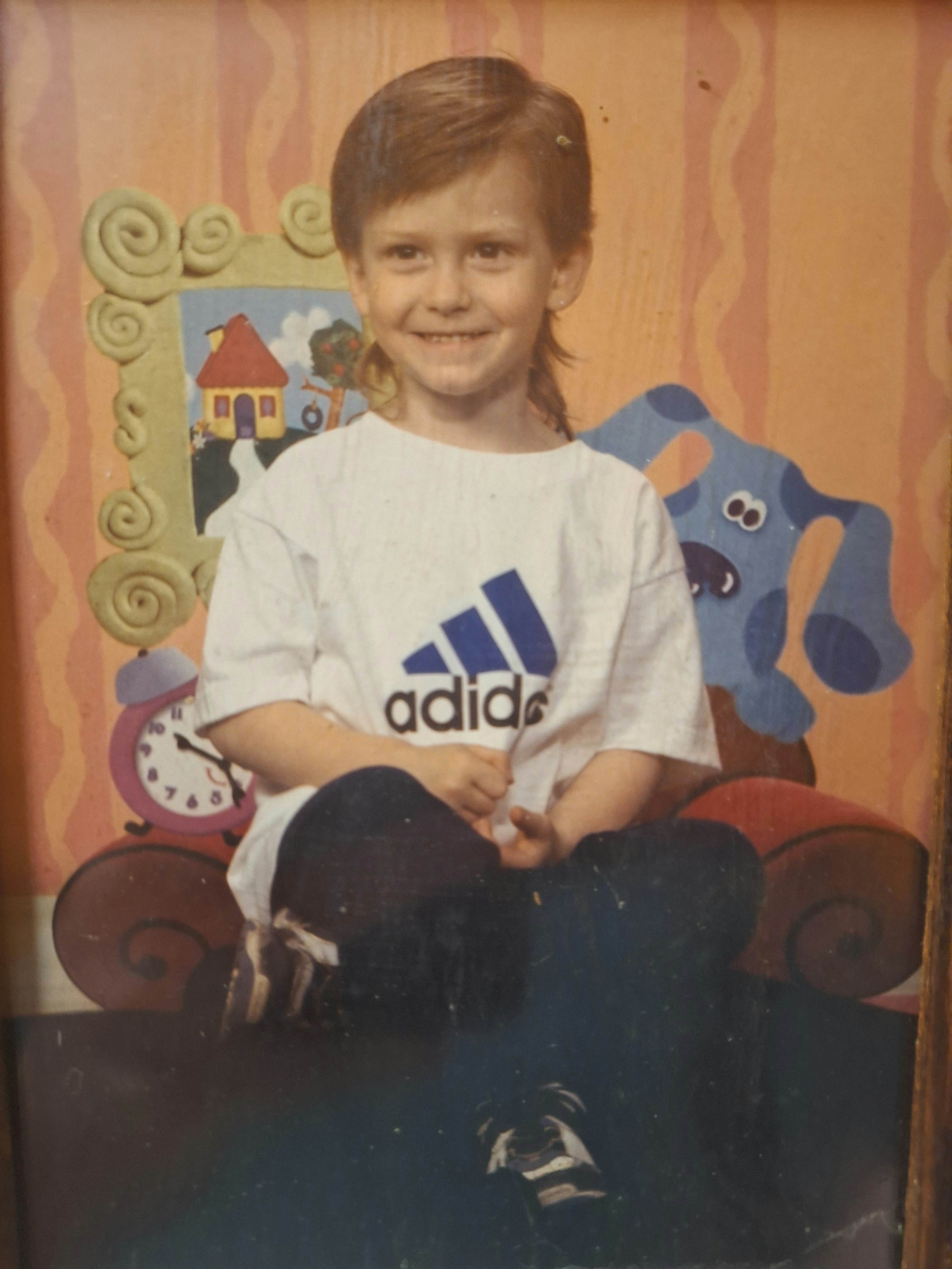 Young Adidas Enthusiast: A Nostalgic Studio Moment