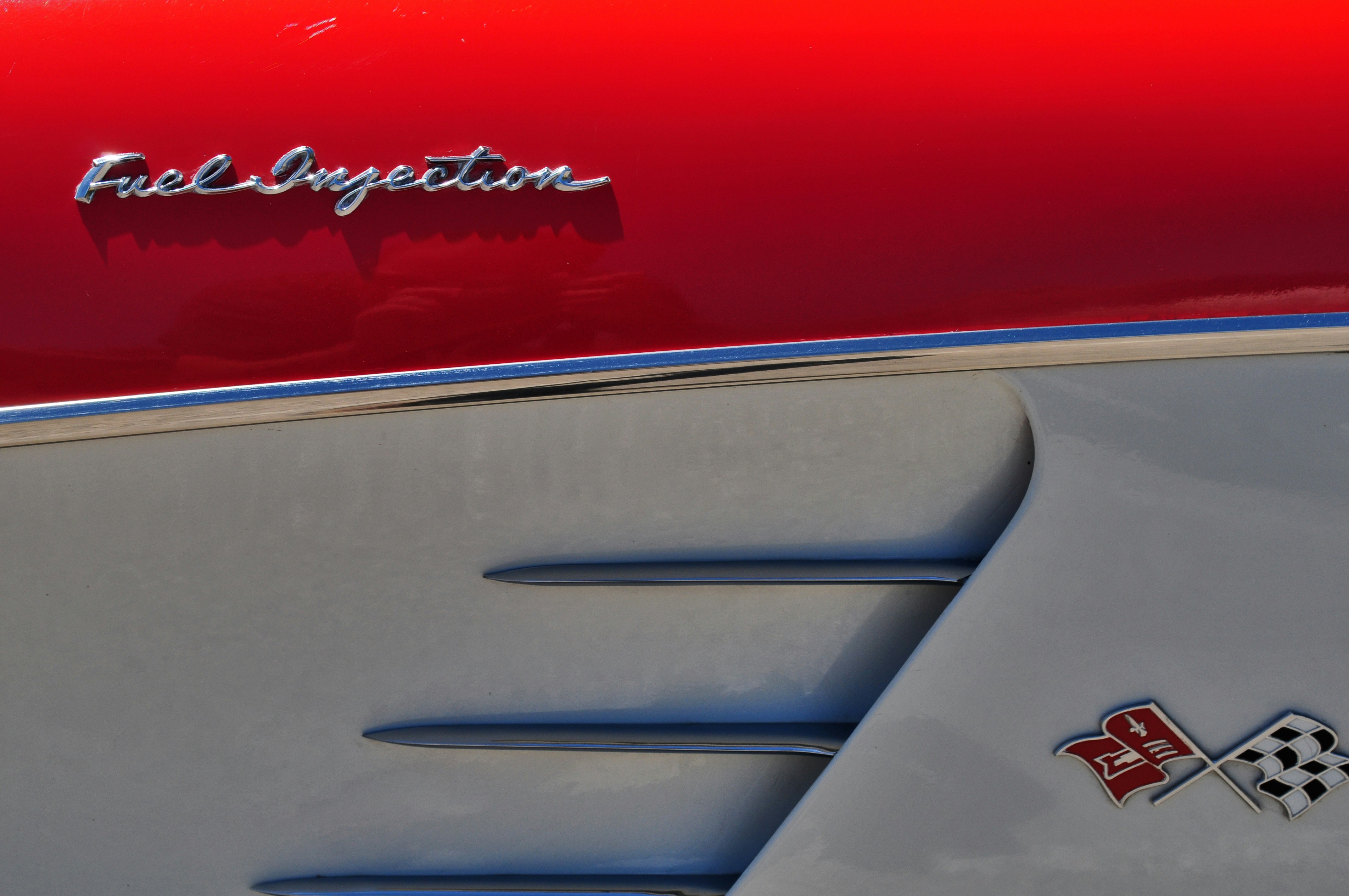 Corvette Emblem and Vents: Chrome Script on a Red Sled