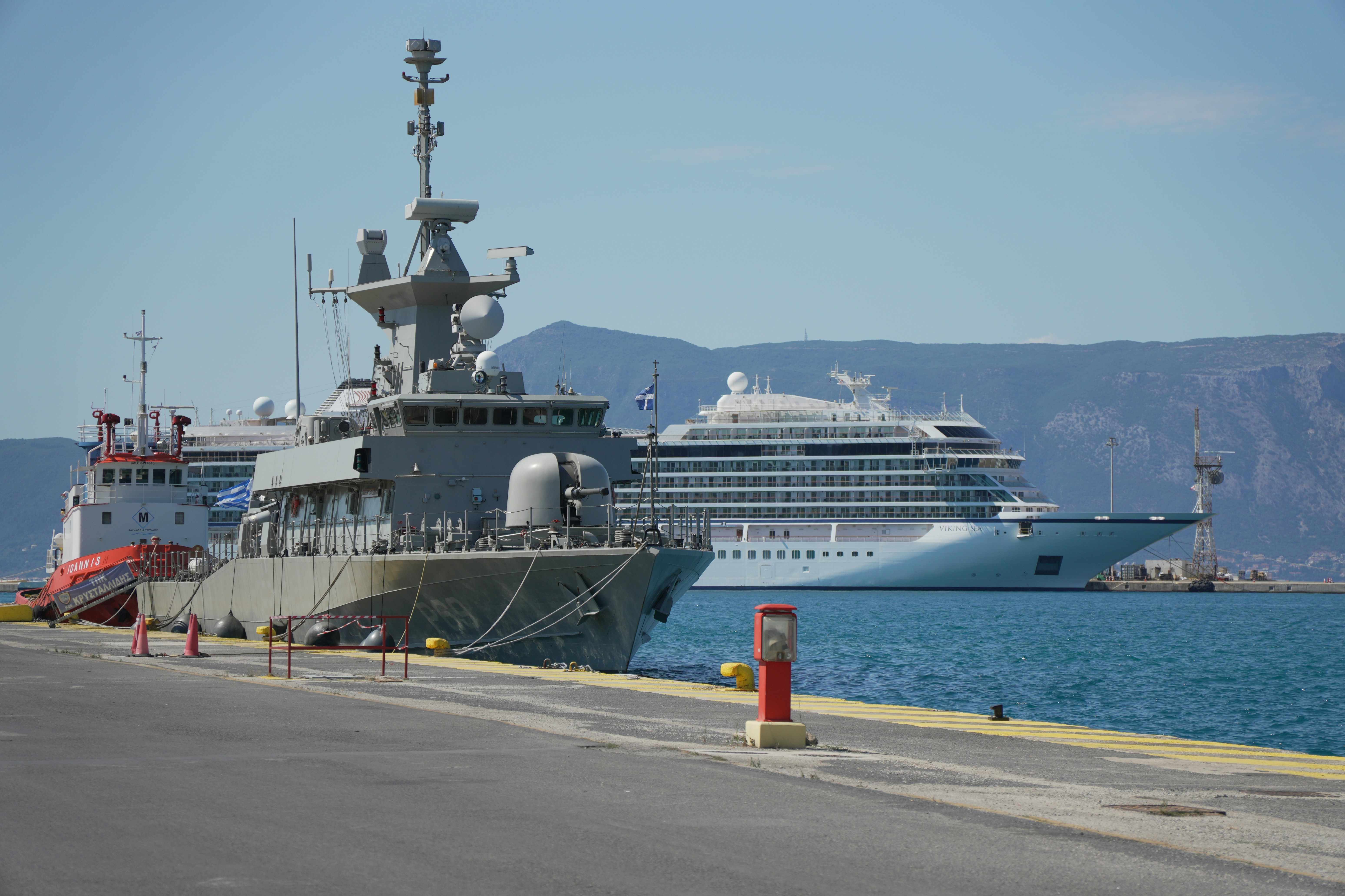 Harbor Giants: A Dual-Ship Wake at Dock