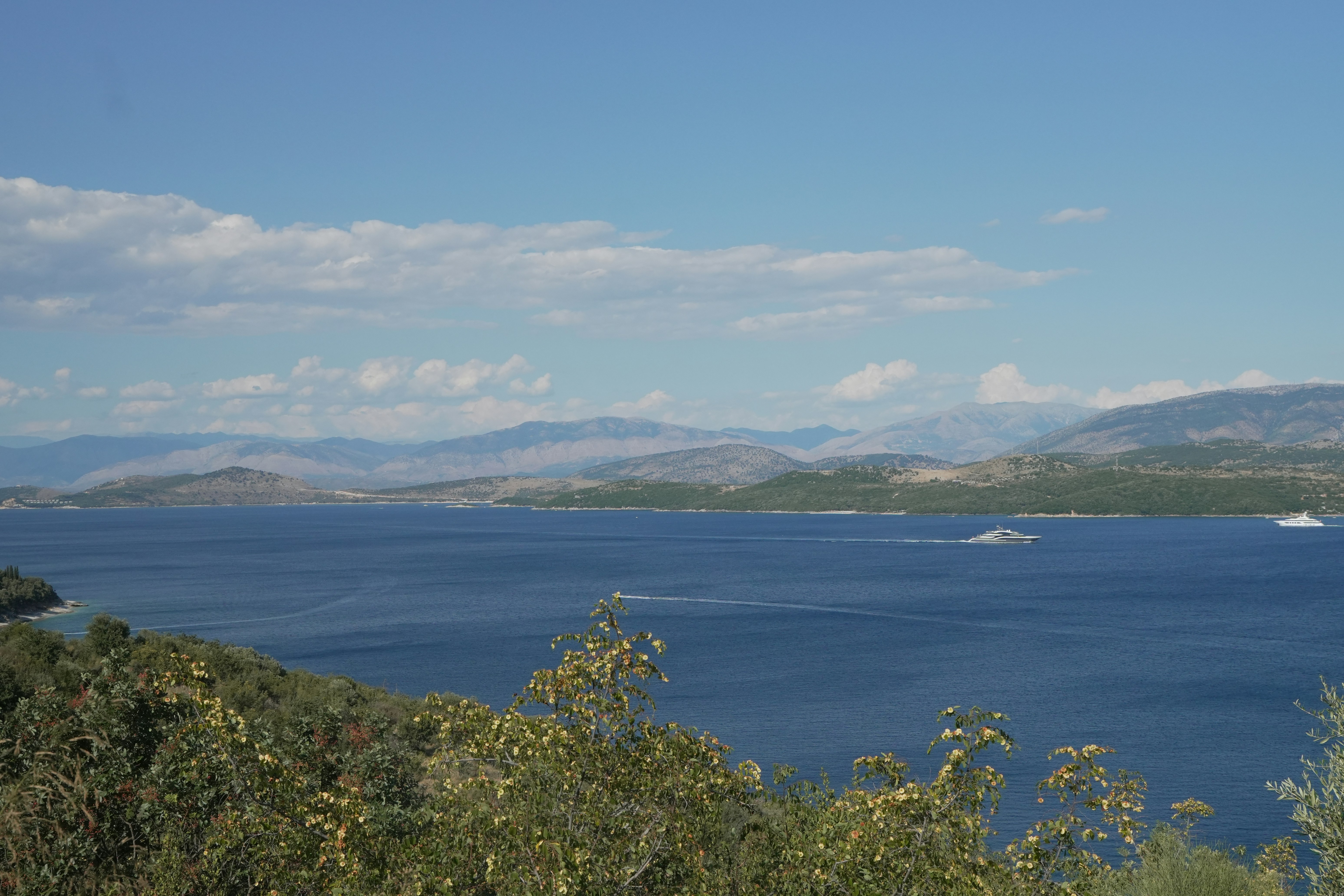 Azure Coastline Beneath a Quiet Sky