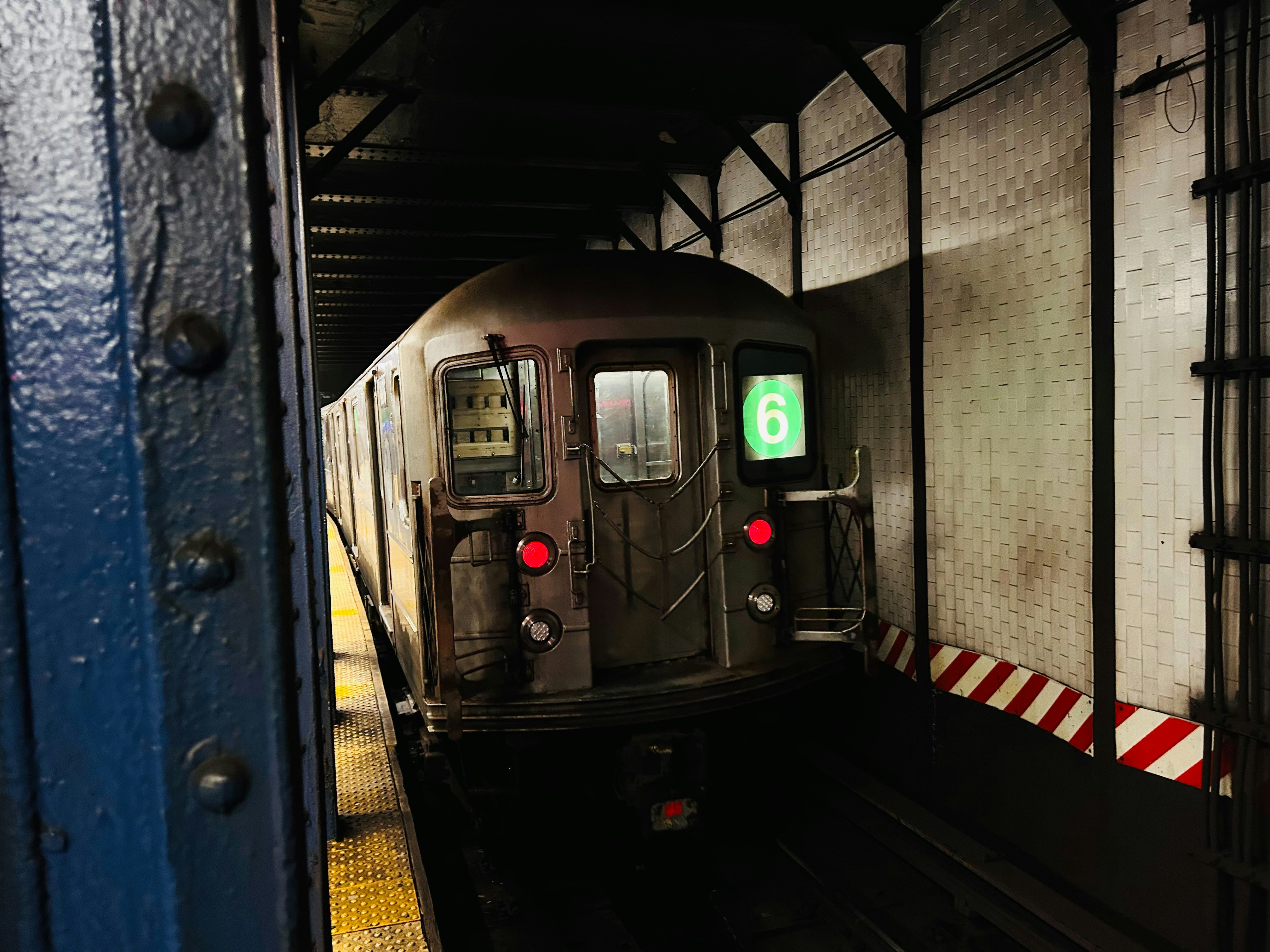 Midnight Ride: The Underground Carriage with a Green Sign