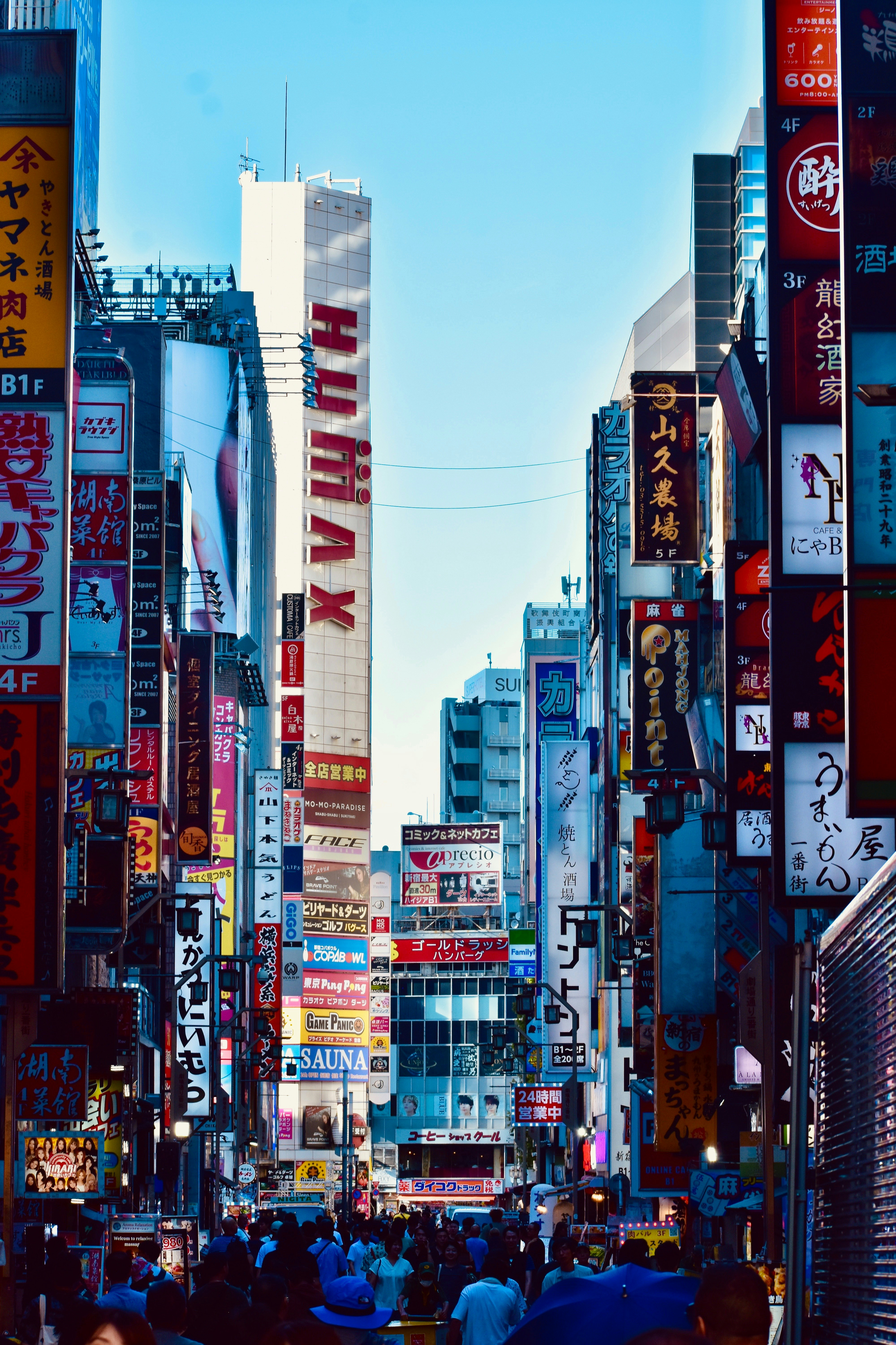 Neon Canyon: A Crowded Tokyo Street Draws the Eye Down the Alley