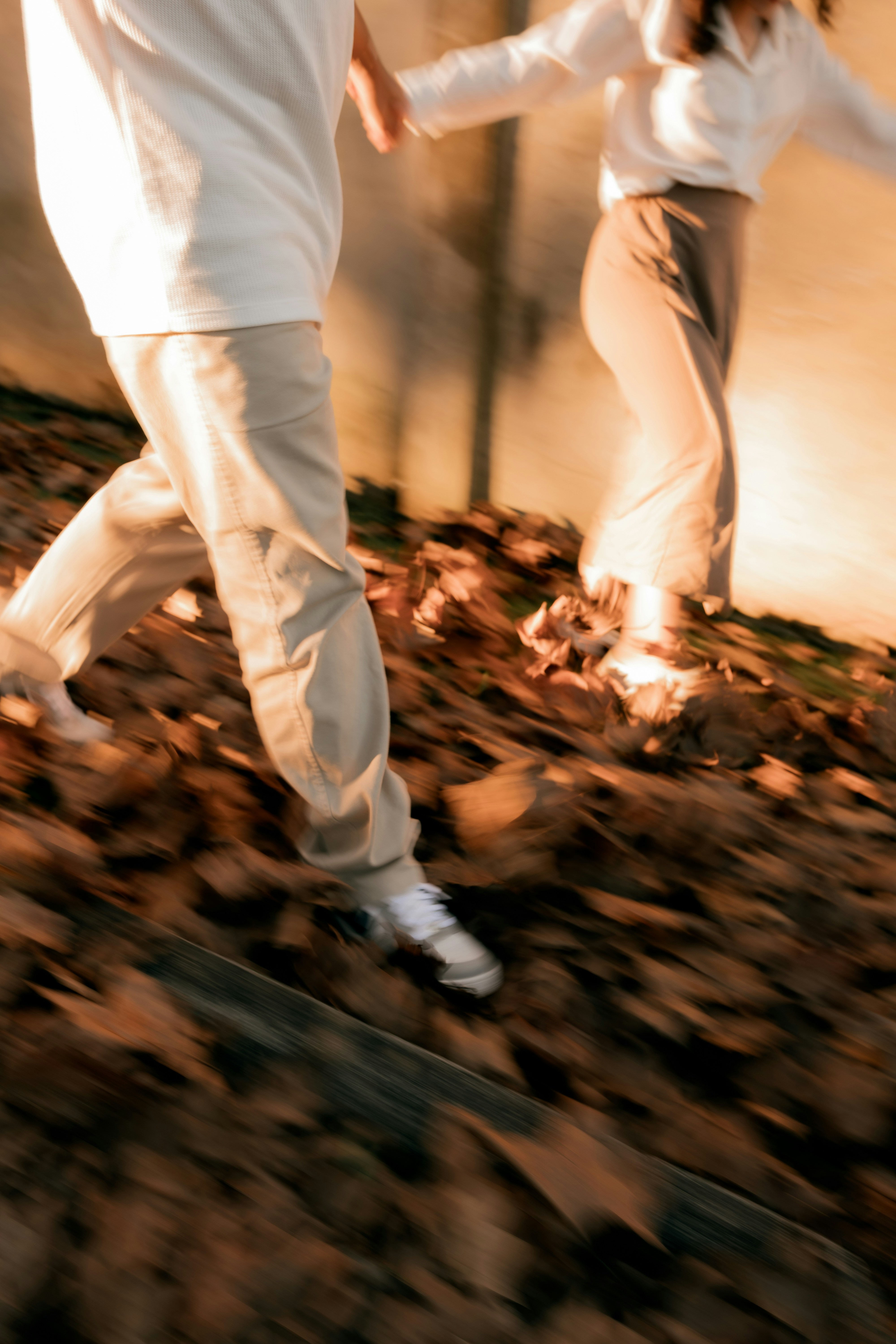 Falling Leaves, Moving Feet: A Blur of Autumn Motion