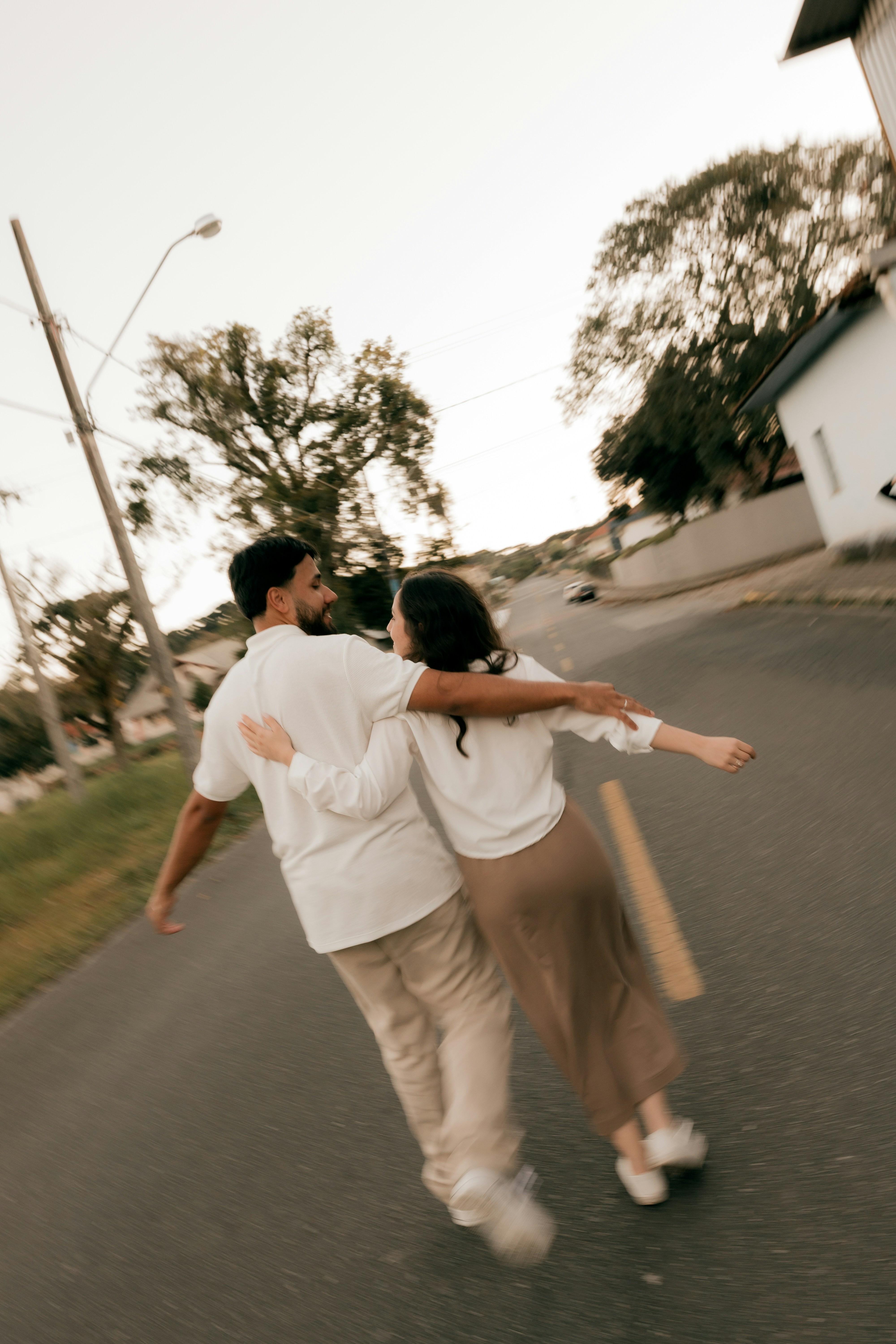 Two Walkers Share a Moment: A Blur of City Street camaraderie