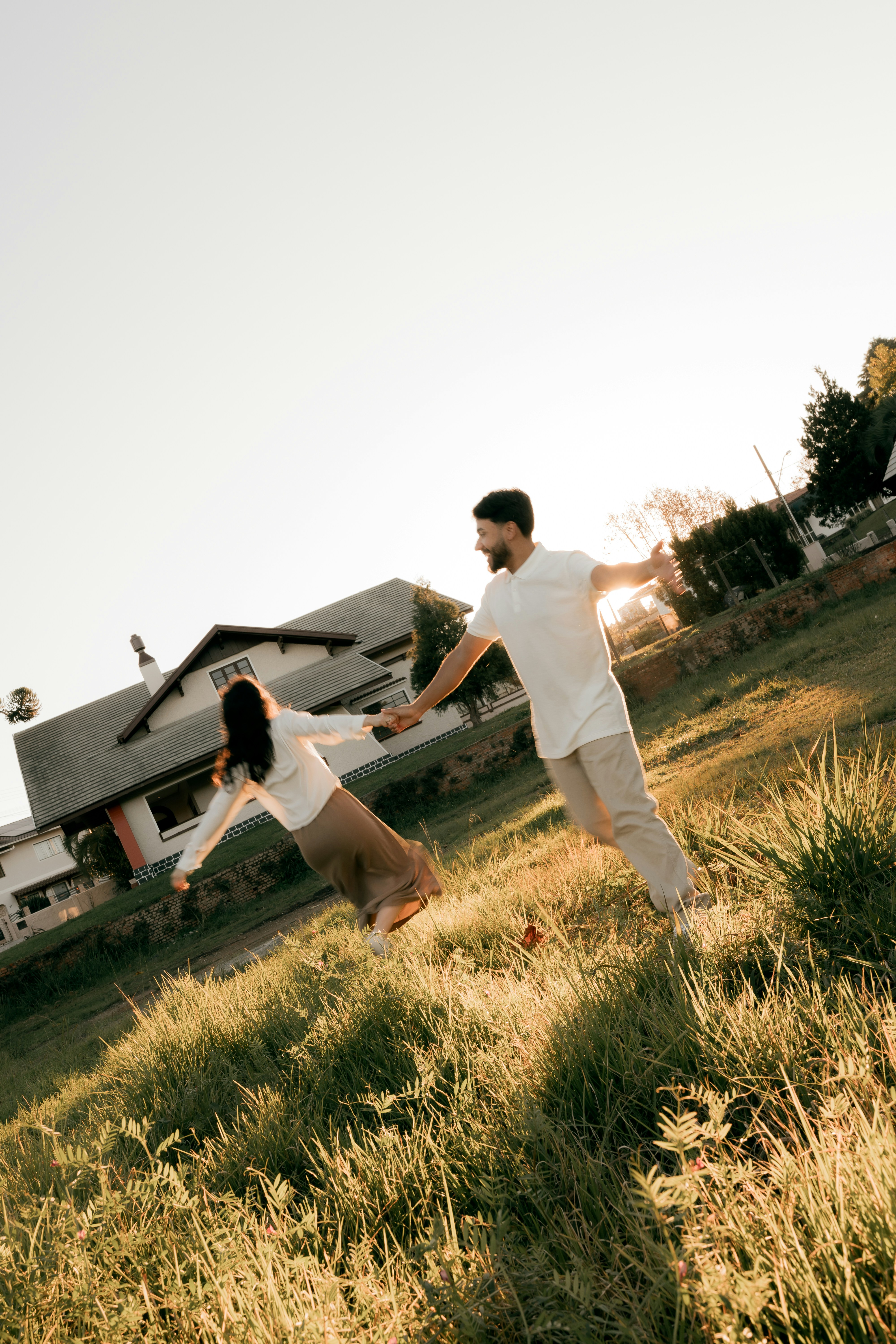 Holding On: A Moment of Friendship in Golden Hour Light