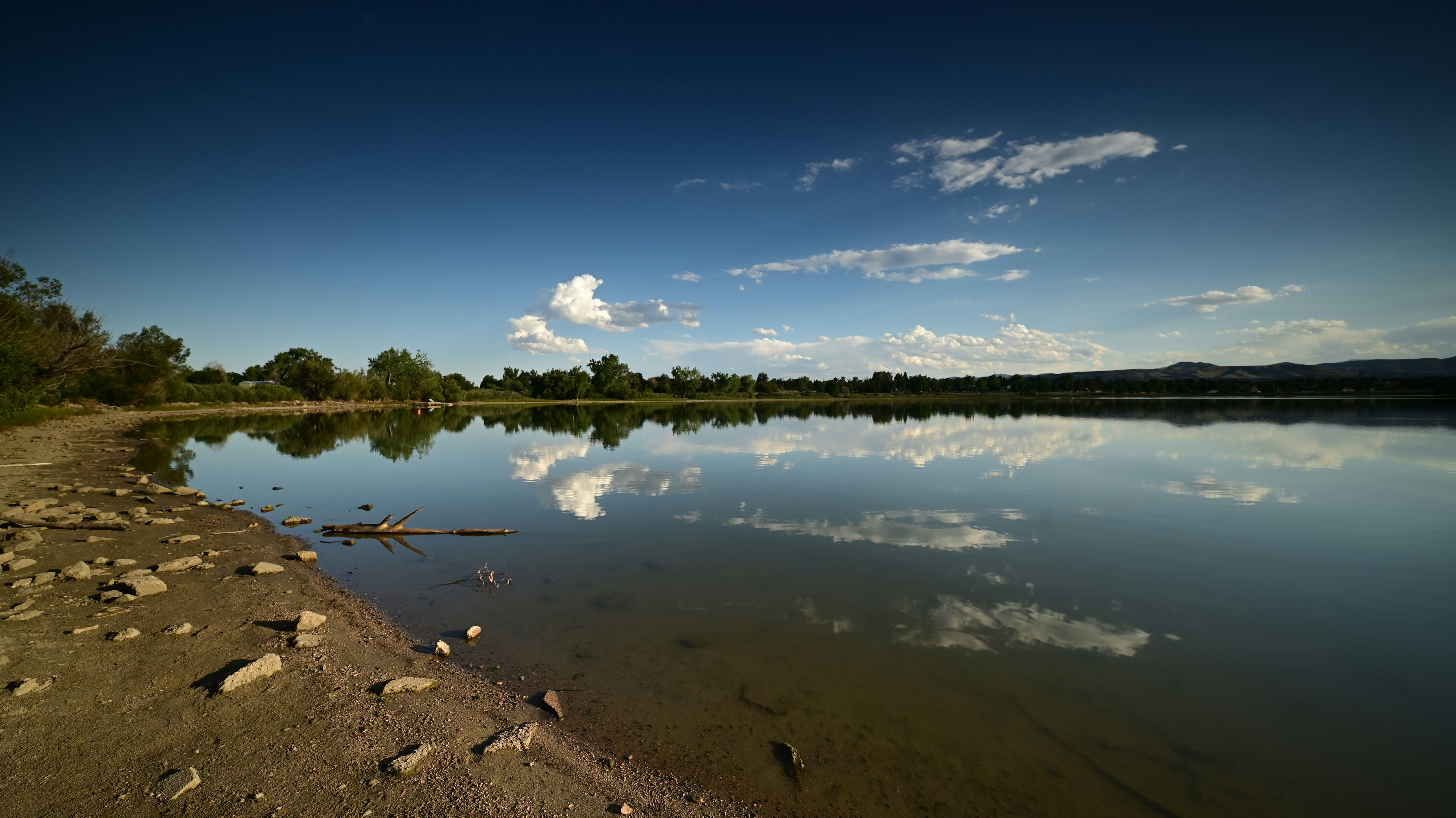 Mirror Lake at Dusk: Grounded Shoreline Meets an Infinite Sky