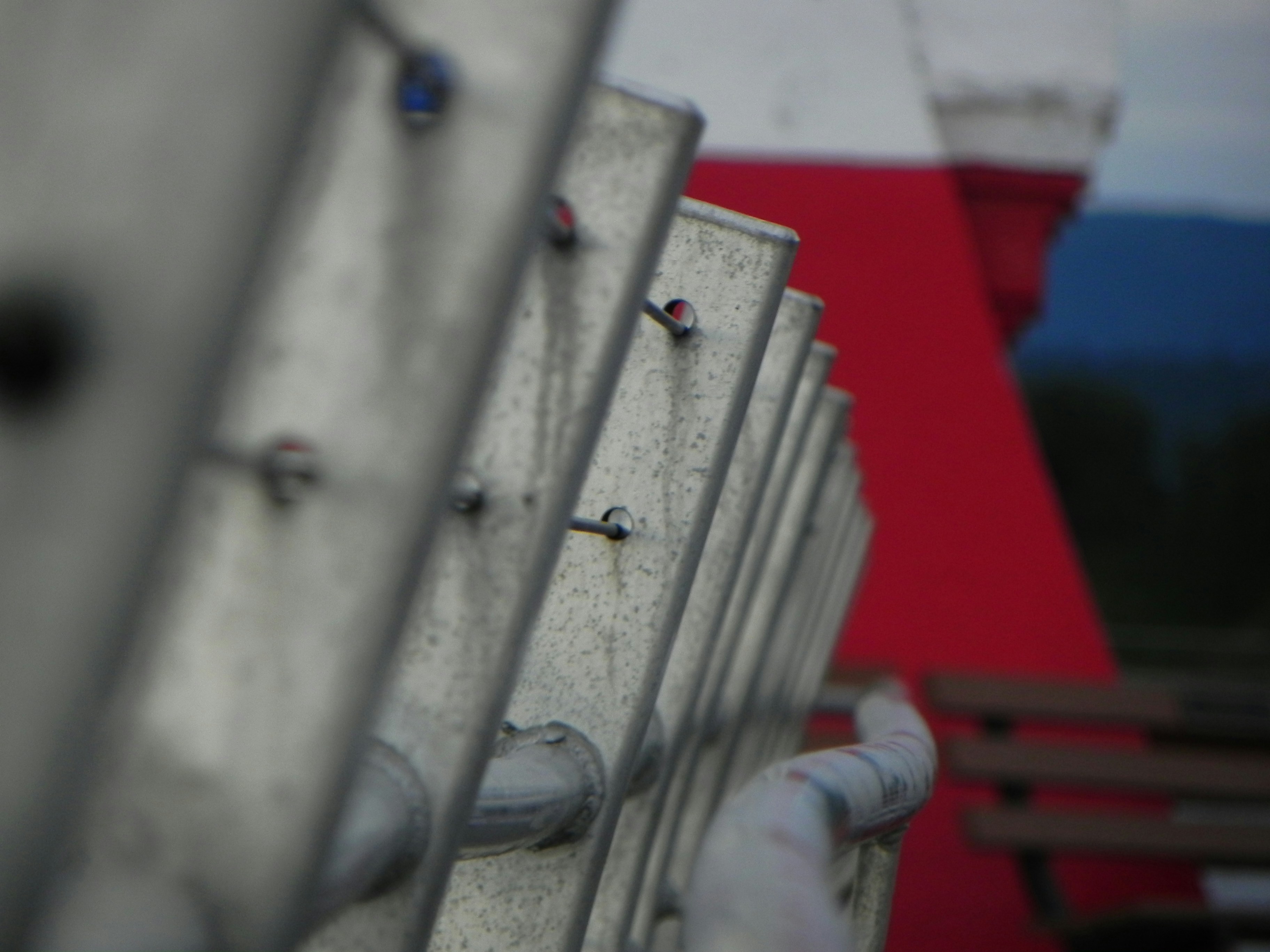 Railings and bolts: a diagonal study of industrial perspective