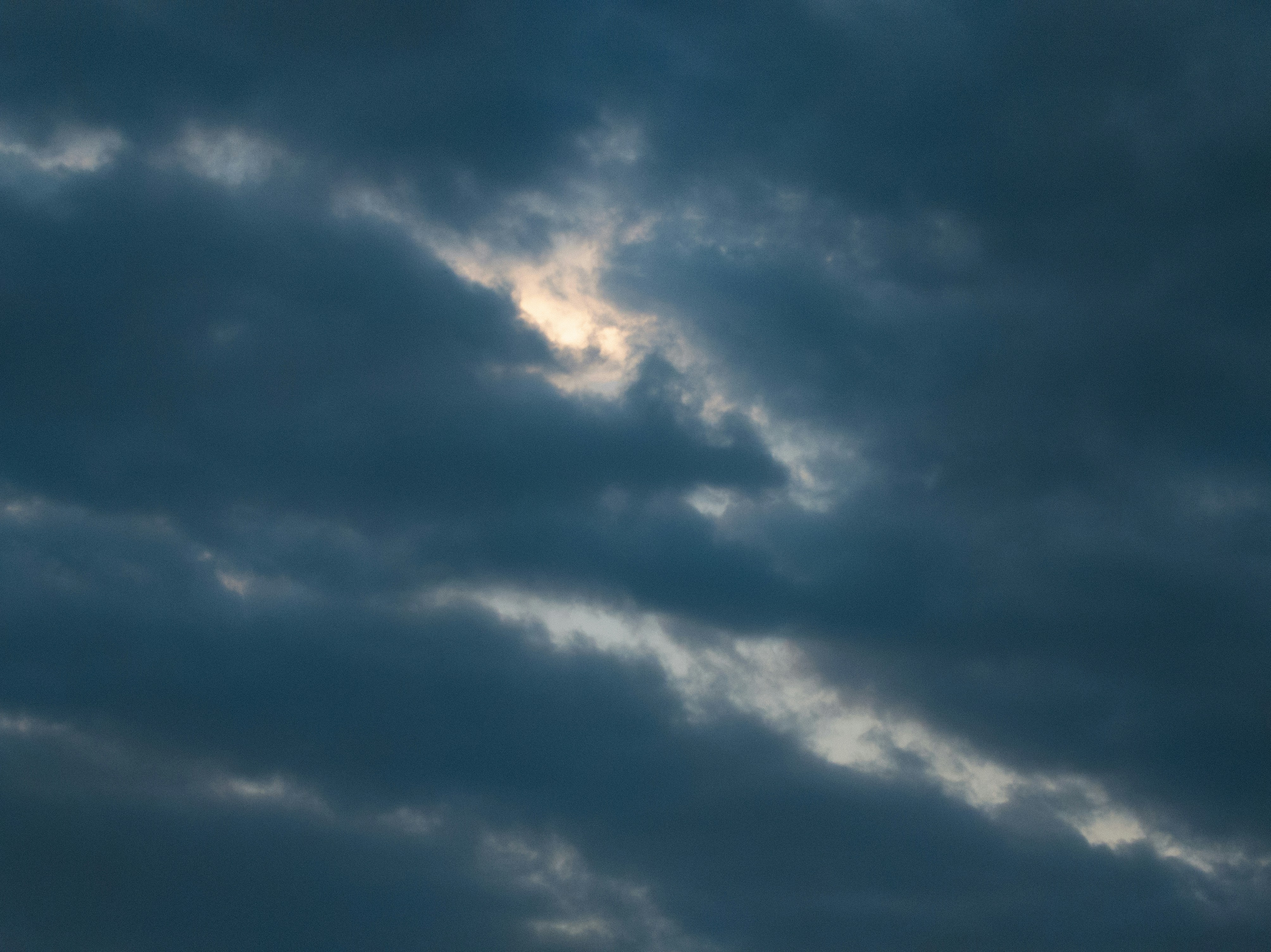 Break in the Cloud: A Quiet Glimpse of Light