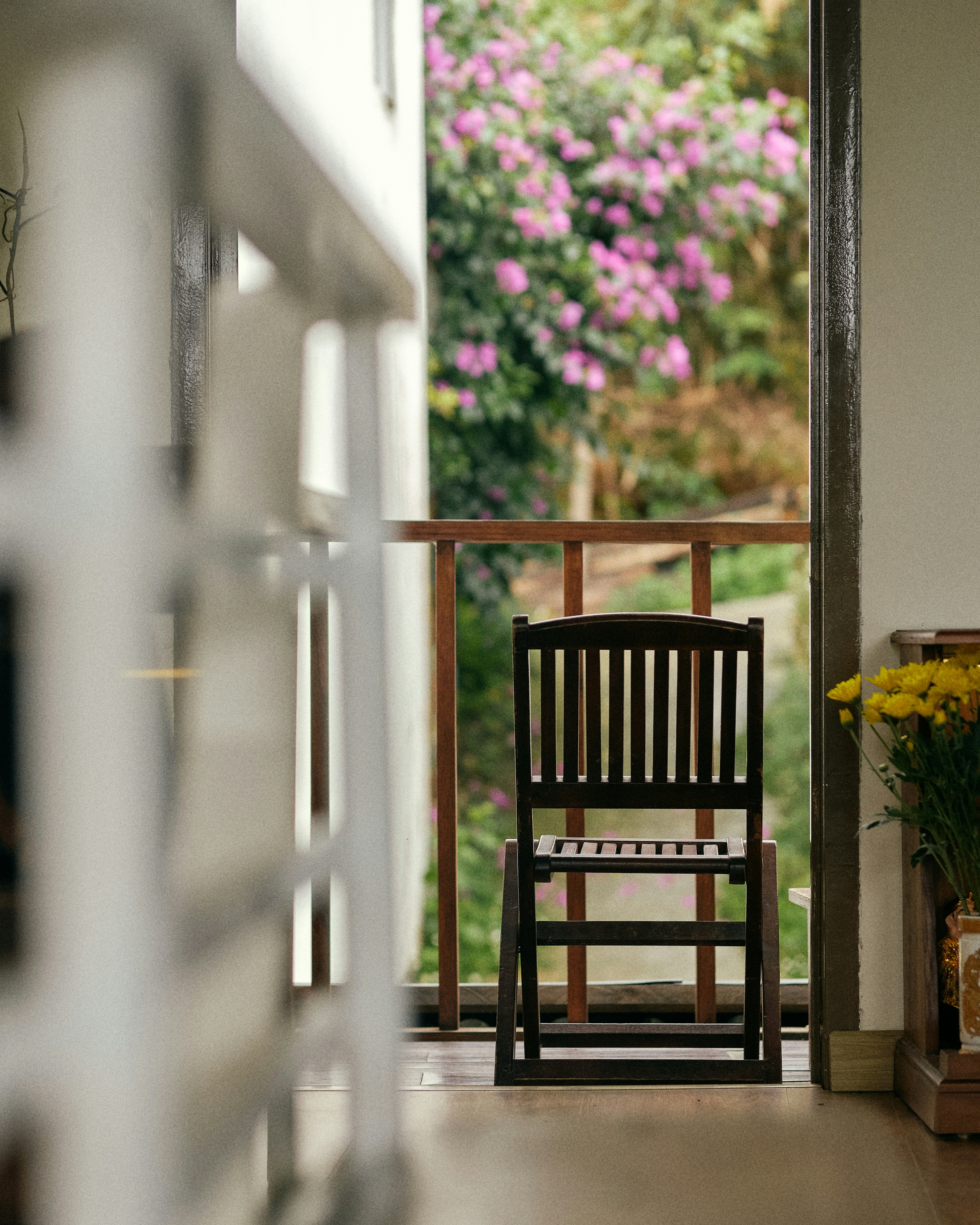 Vacant Chair at a Sunlit Porch